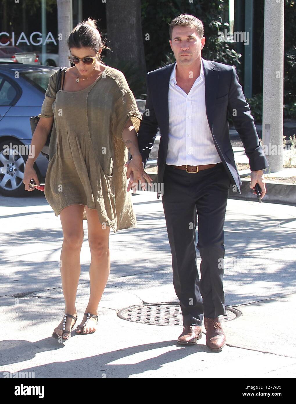 Heavily pregnant Elisabetta Canalis out and about holding hands with ...