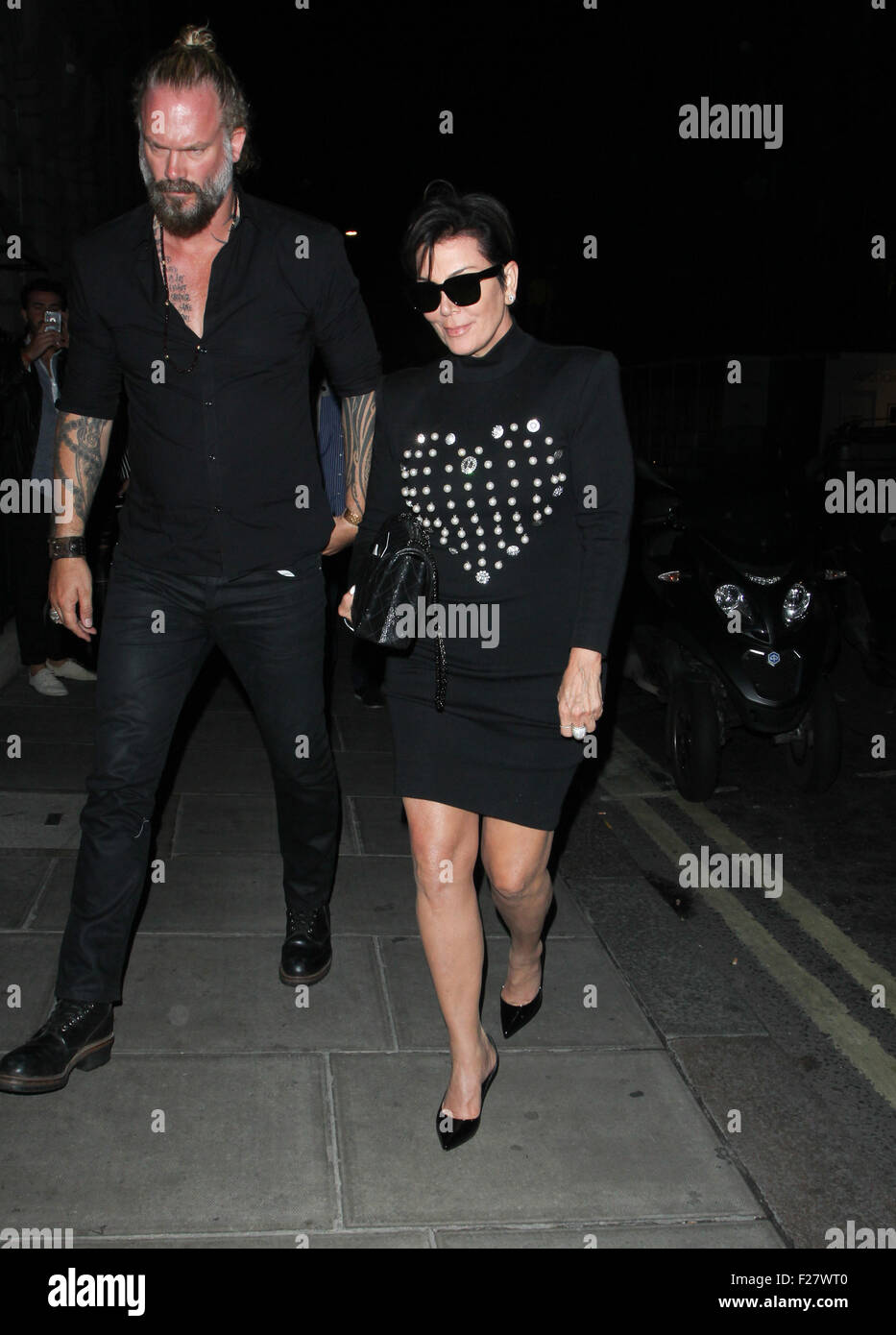 Kris Jenner returns to her hotel wearing all black with heart shape ...