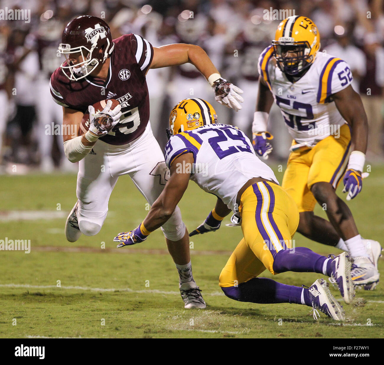 Mississippi State TE, Gus Walley (19) catches a pass between LSU LB ...