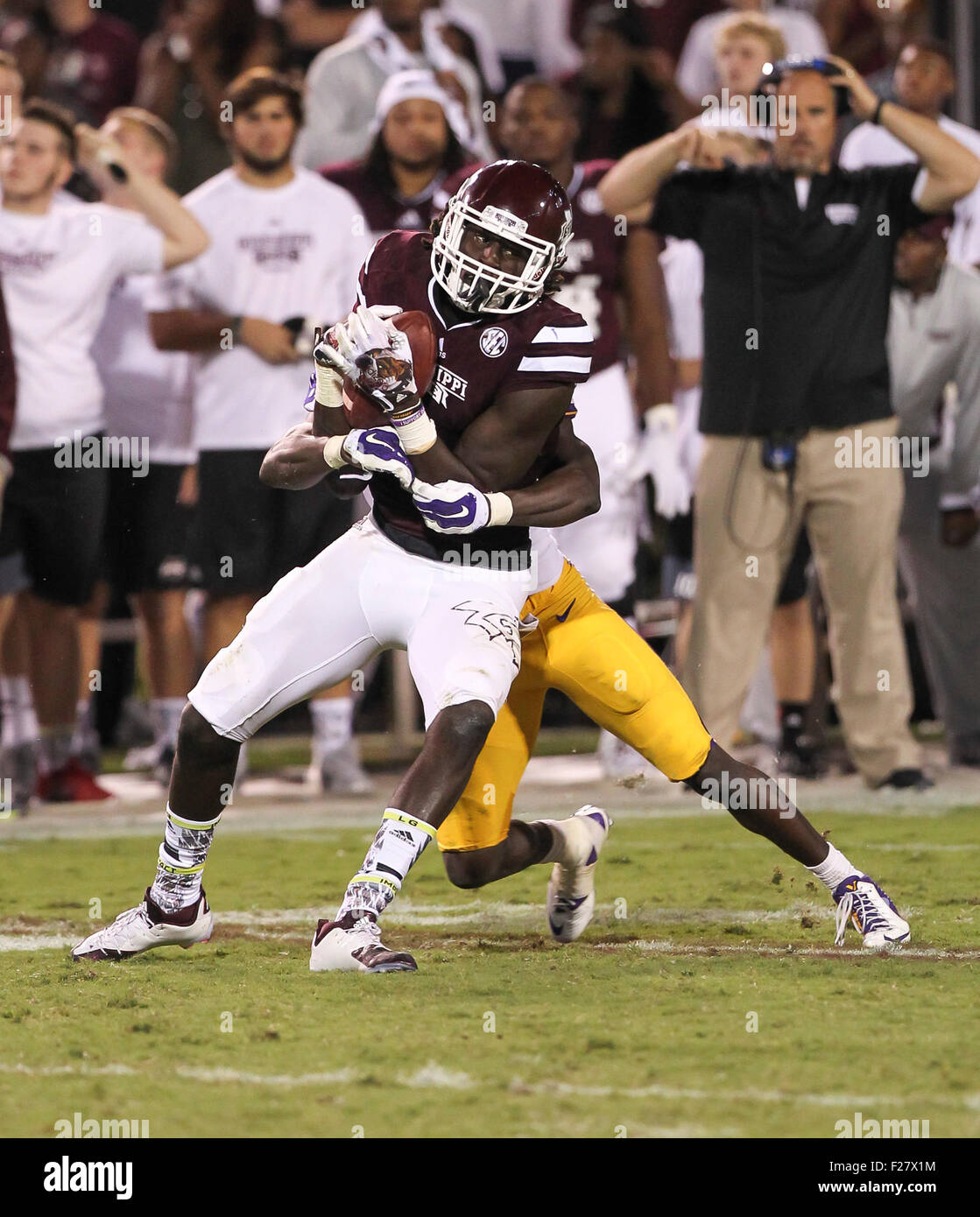 Mississippi State WR, De'Runnya Wilson (1) is tackled by LSU CB, Dwayne ...