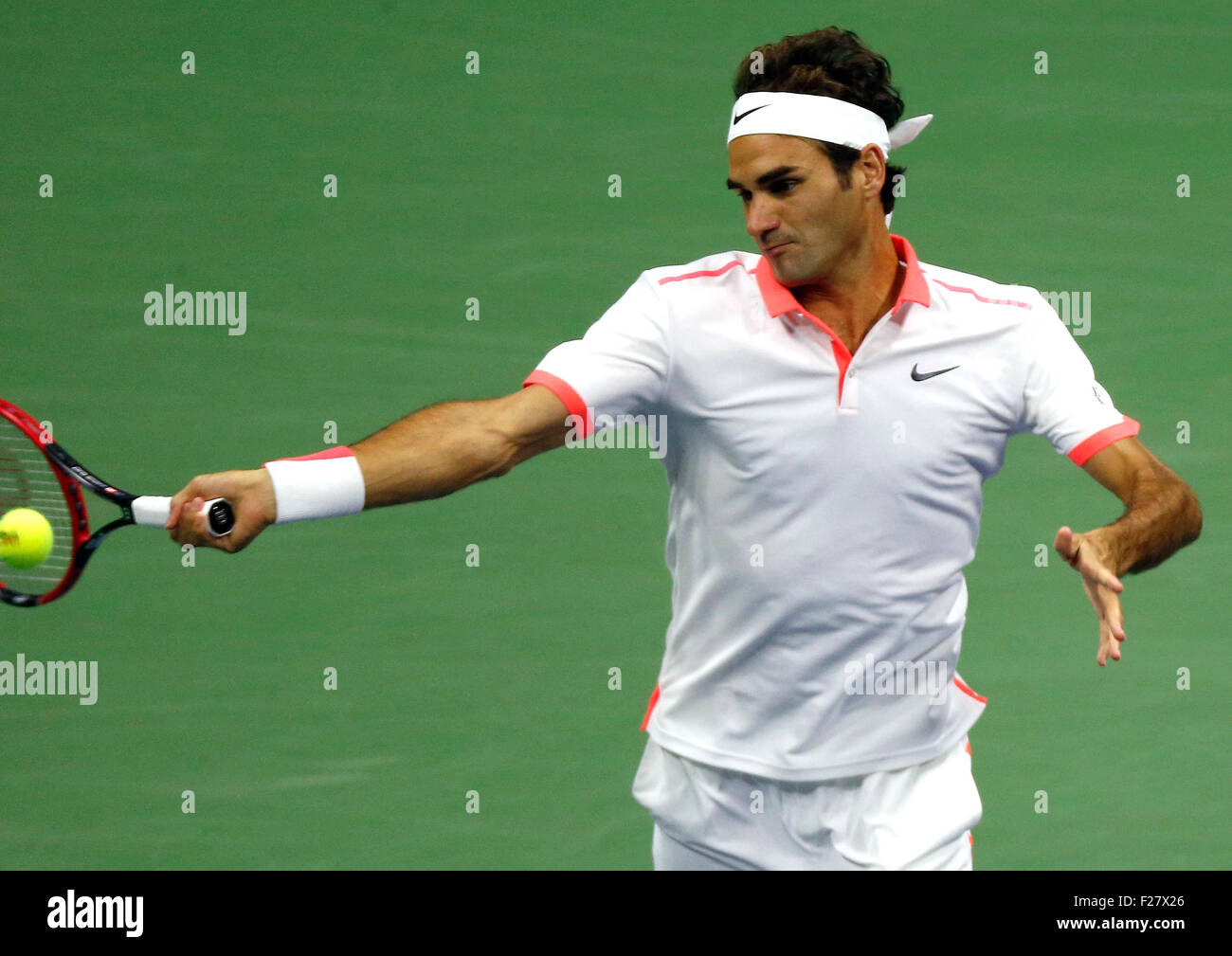 New York, USA. 13th Sep, 2015. Roger Federer of Switzerland returns a ...