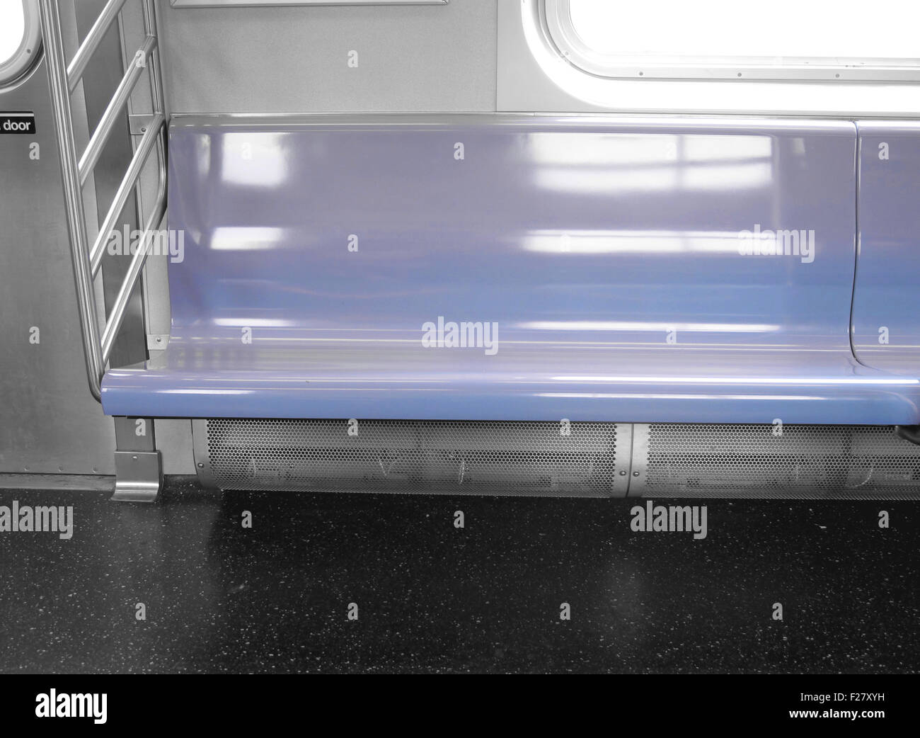 Subway seat in blue with a black and white background Stock Photo - Alamy