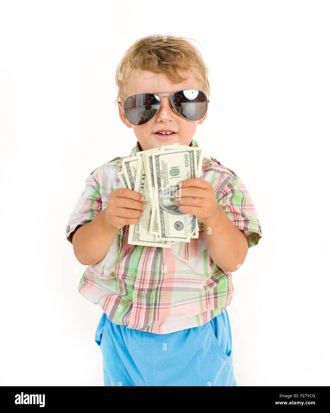 young cute boy holding lot of cash, american dollars isolated close up ...