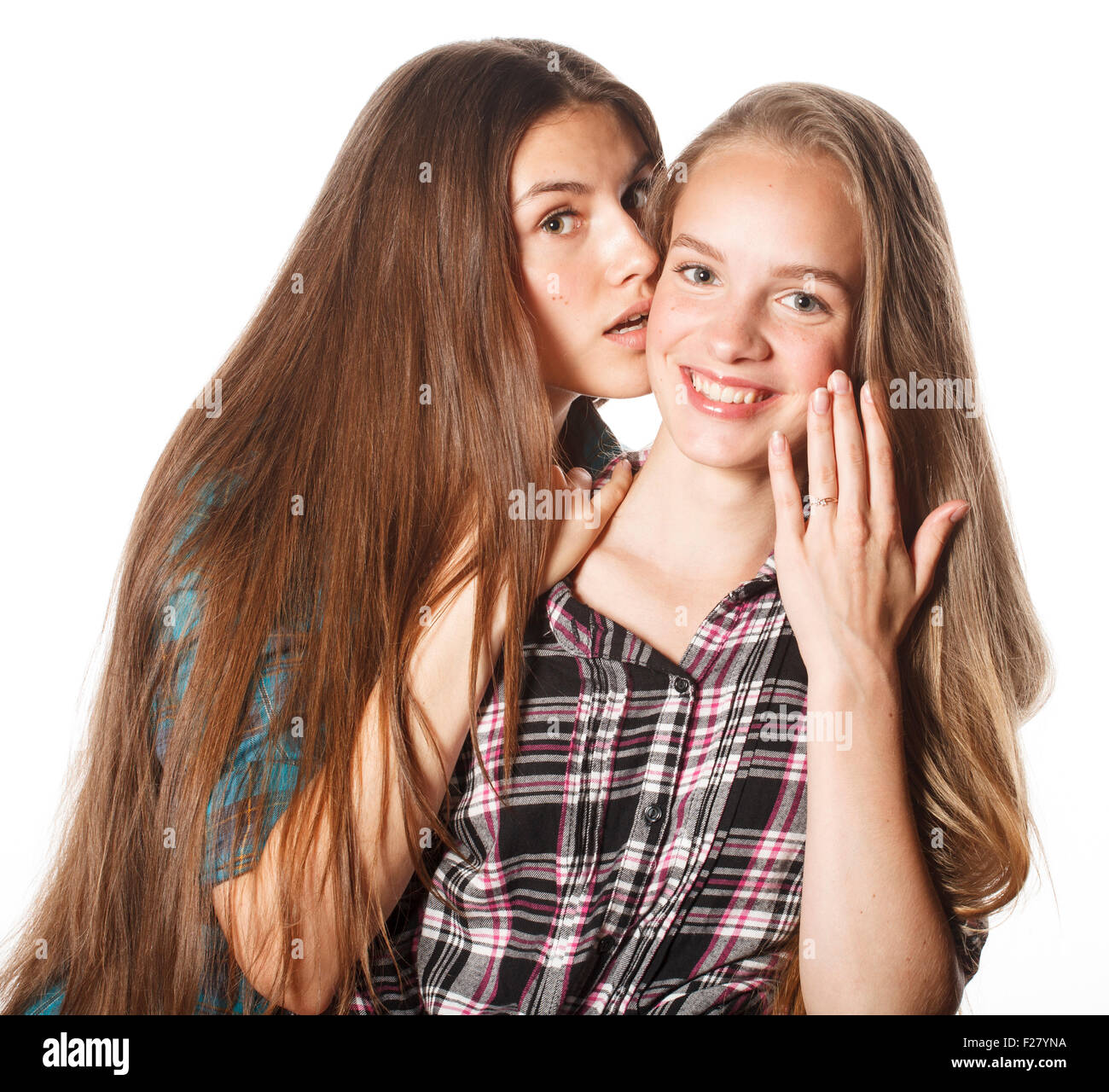 two cute teenagers having fun together isolated on white Stock Photo ...