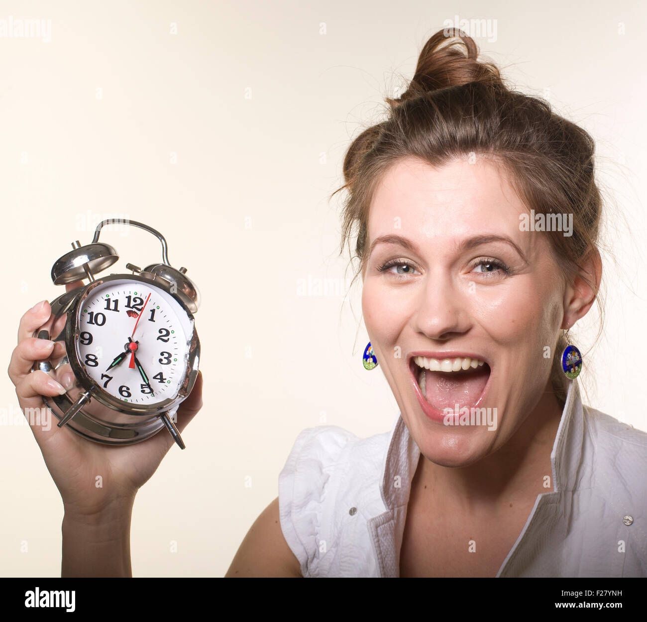 young beauty woman in business style costume waking up for work early ...