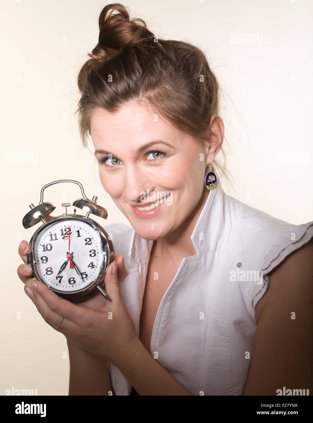young beauty woman in business style costume waking up for work early ...