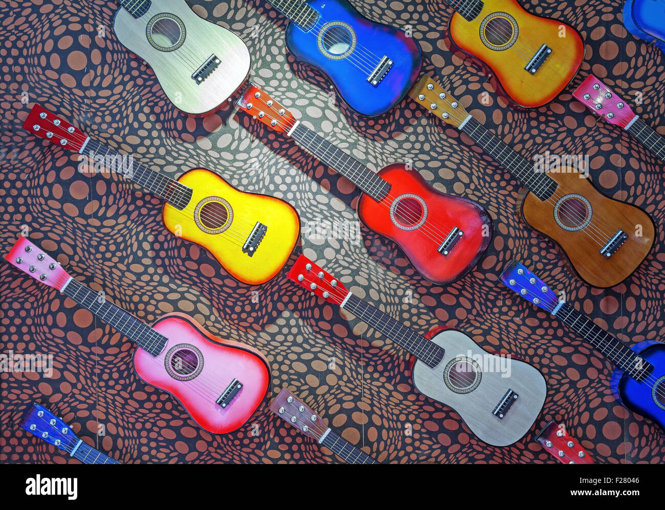 Colored classical acoustic guitars Stock Photo - Alamy