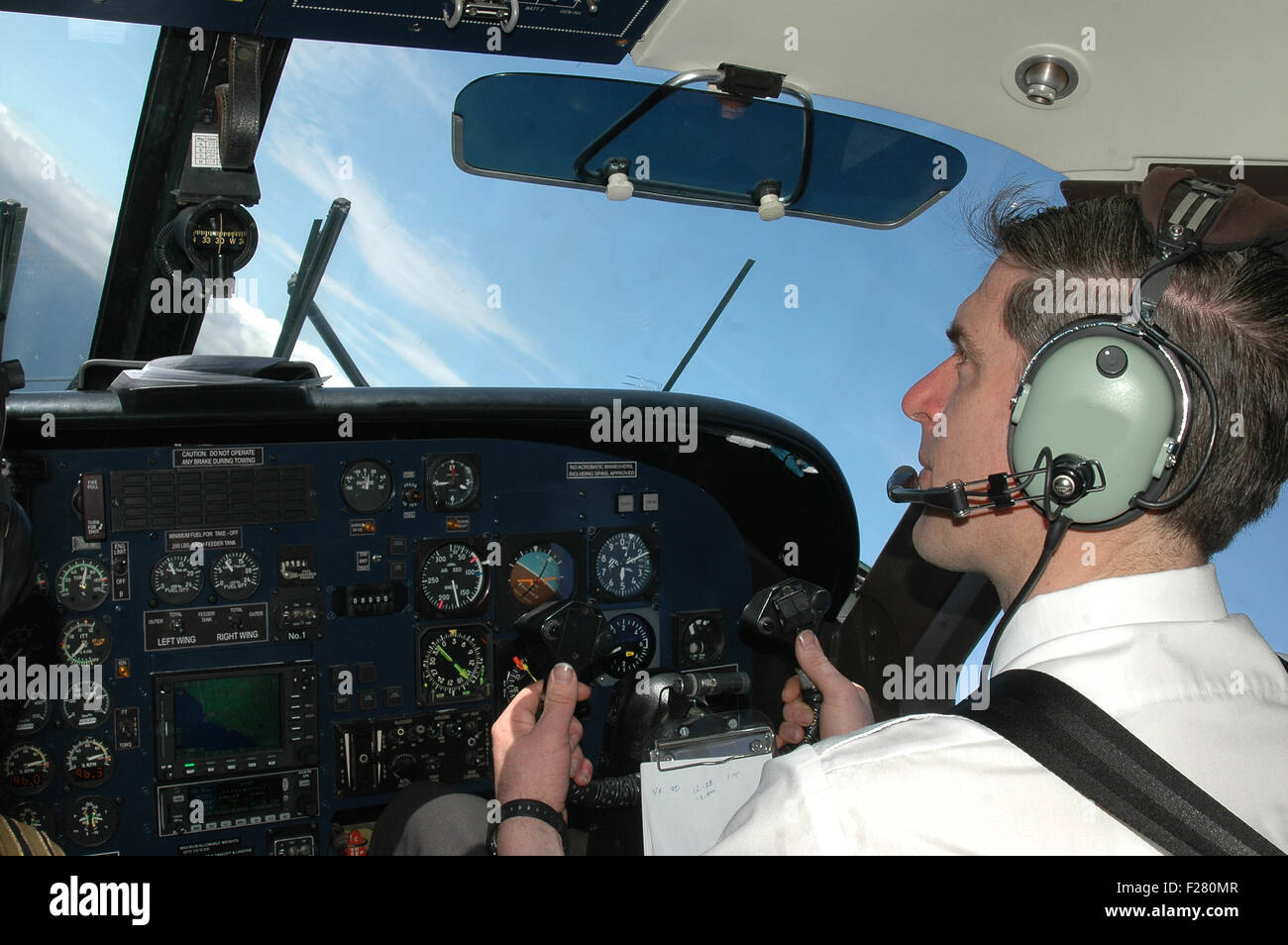 pilot at aircraft cockpit in Dornier 228 Stock Photo - Alamy