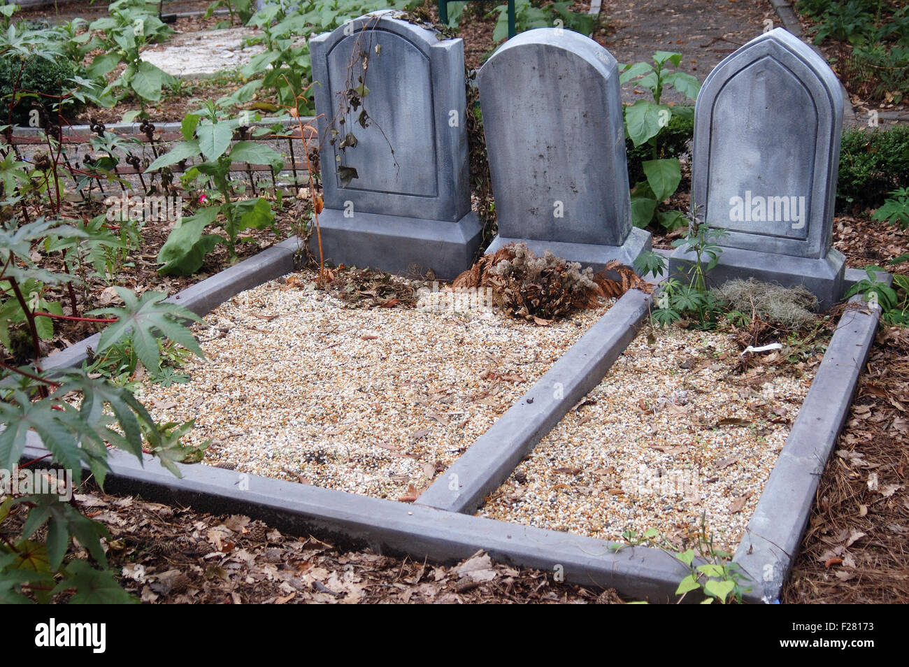 three old nameless tombstone in cemetery setting Stock Photo - Alamy