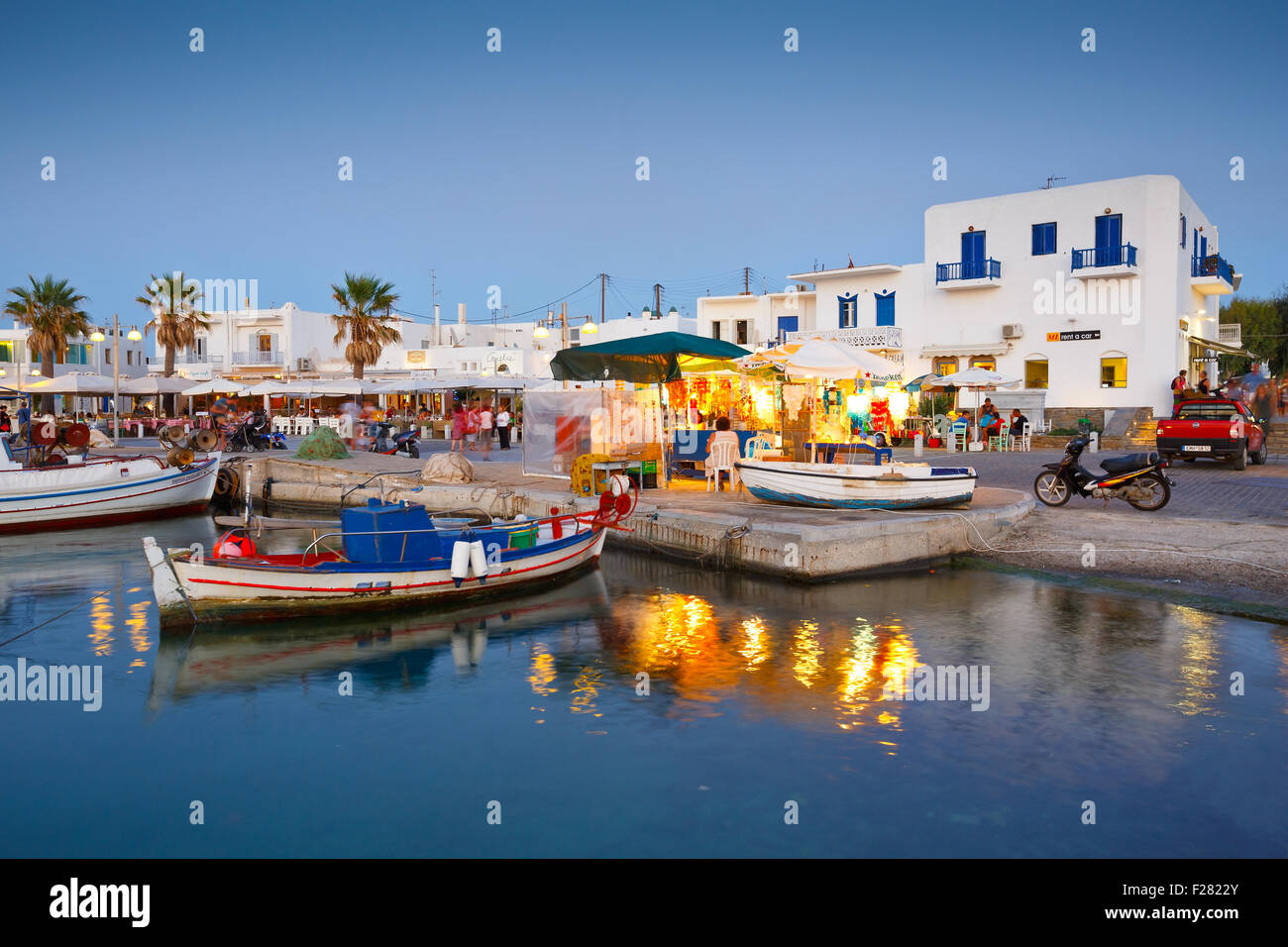 Coffee shops on the seafront in the harbour of Naousa village on Paros ...