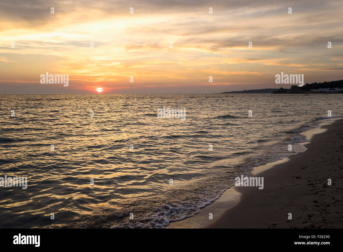 Sunset over sea, Puglia, Italy Stock Photo - Alamy