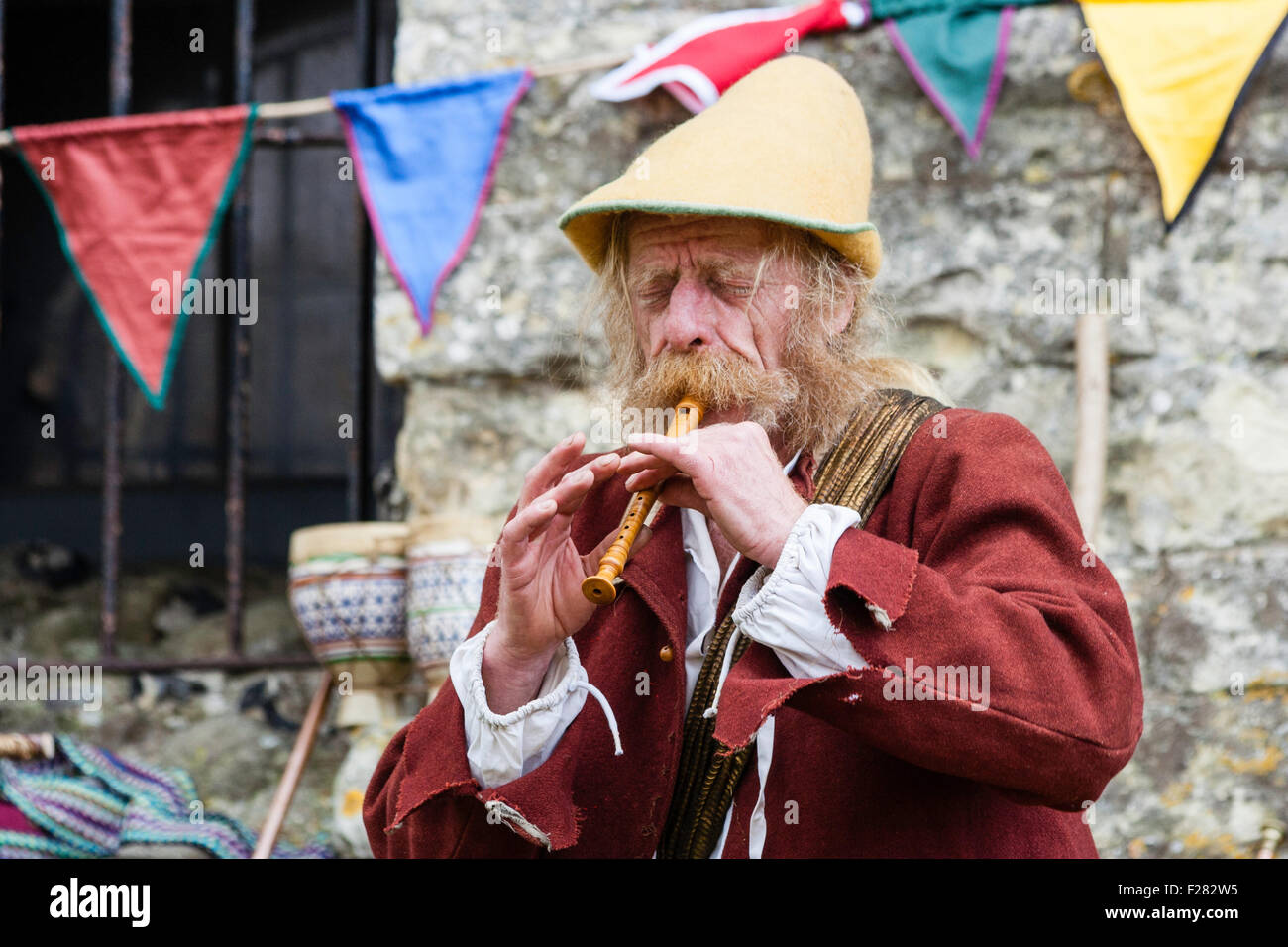 Medieval re-enactment. living history event. Senior adult, bushy side ...
