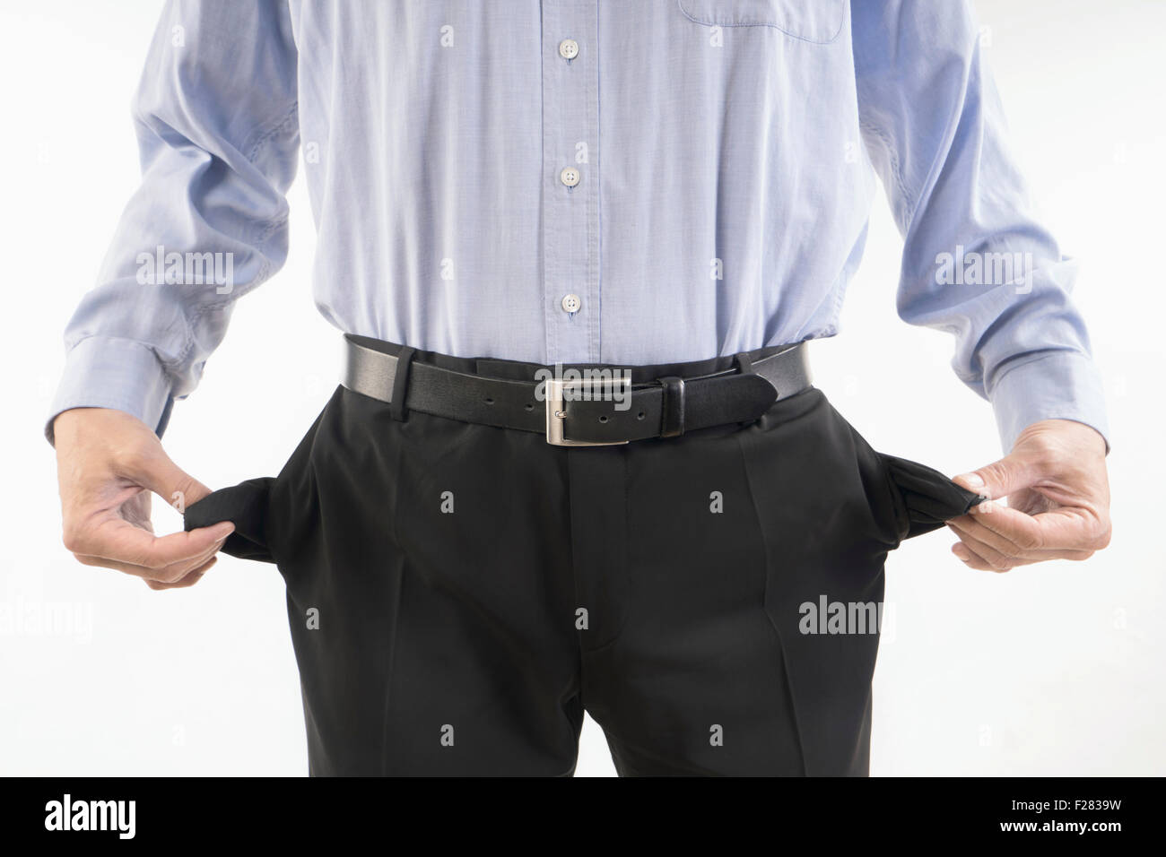 Bankrupt man showing empty pocket hi-res stock photography and images ...