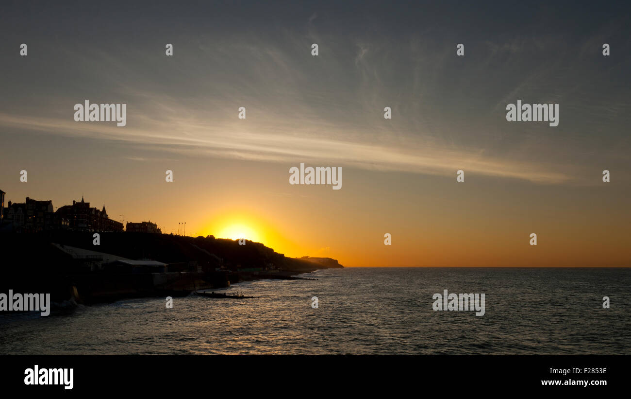 Cromer at sunset viewed from the pier in Summer in Norfolk England ...