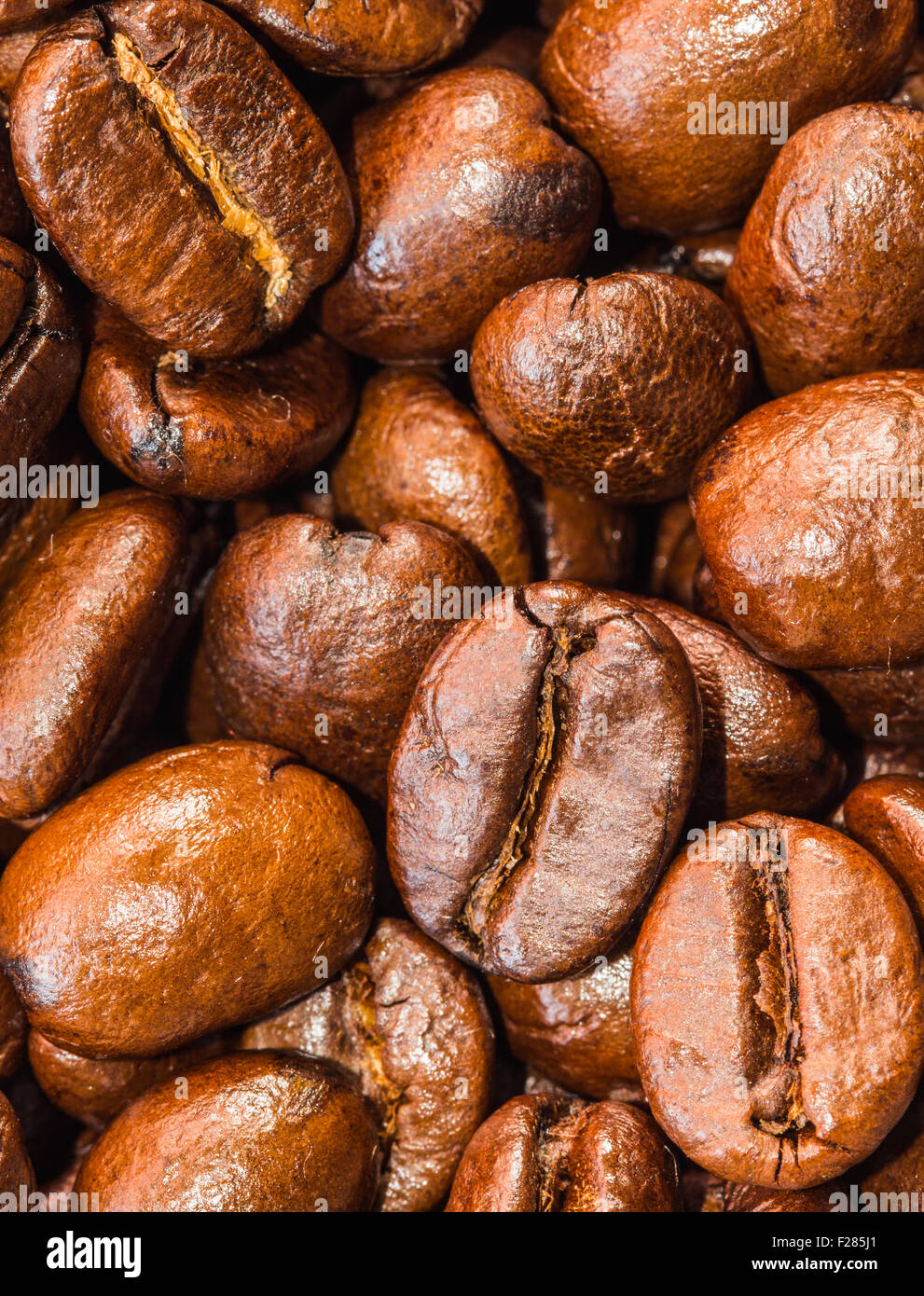 Coffee beans closeup background, macro Stock Photo - Alamy