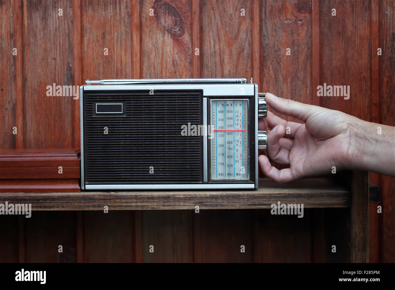 Hand On Radio Reciever Stock Photo - Alamy