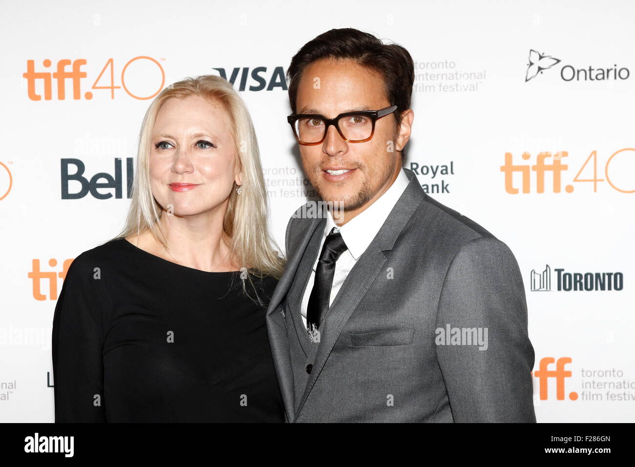 Producer Laura Bickford and director Cary Fukunaga attend the premiere ...