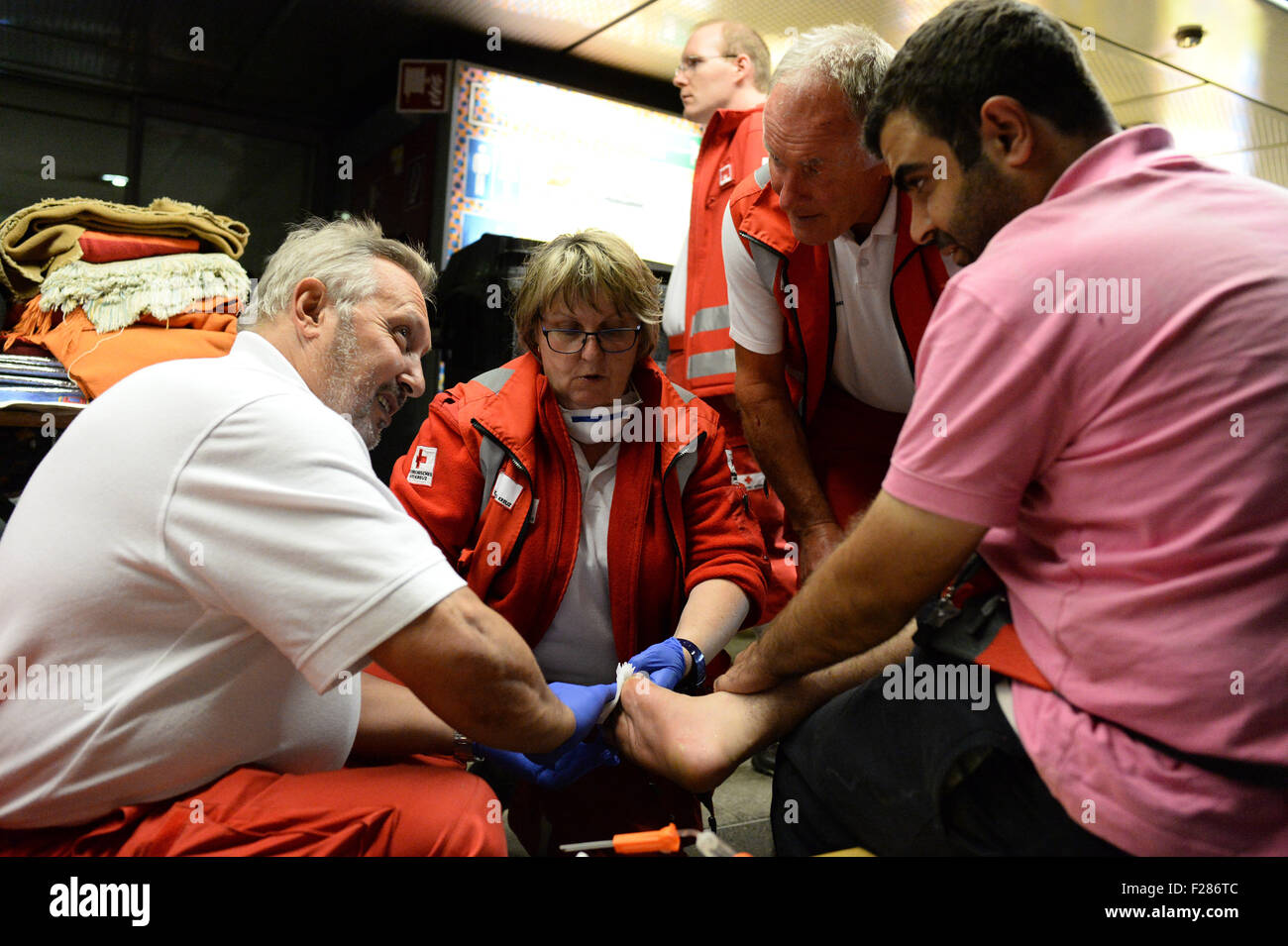 Salzburg, Germany. 13th Sep, 2015. Volunteer helpers of the Austrian ...