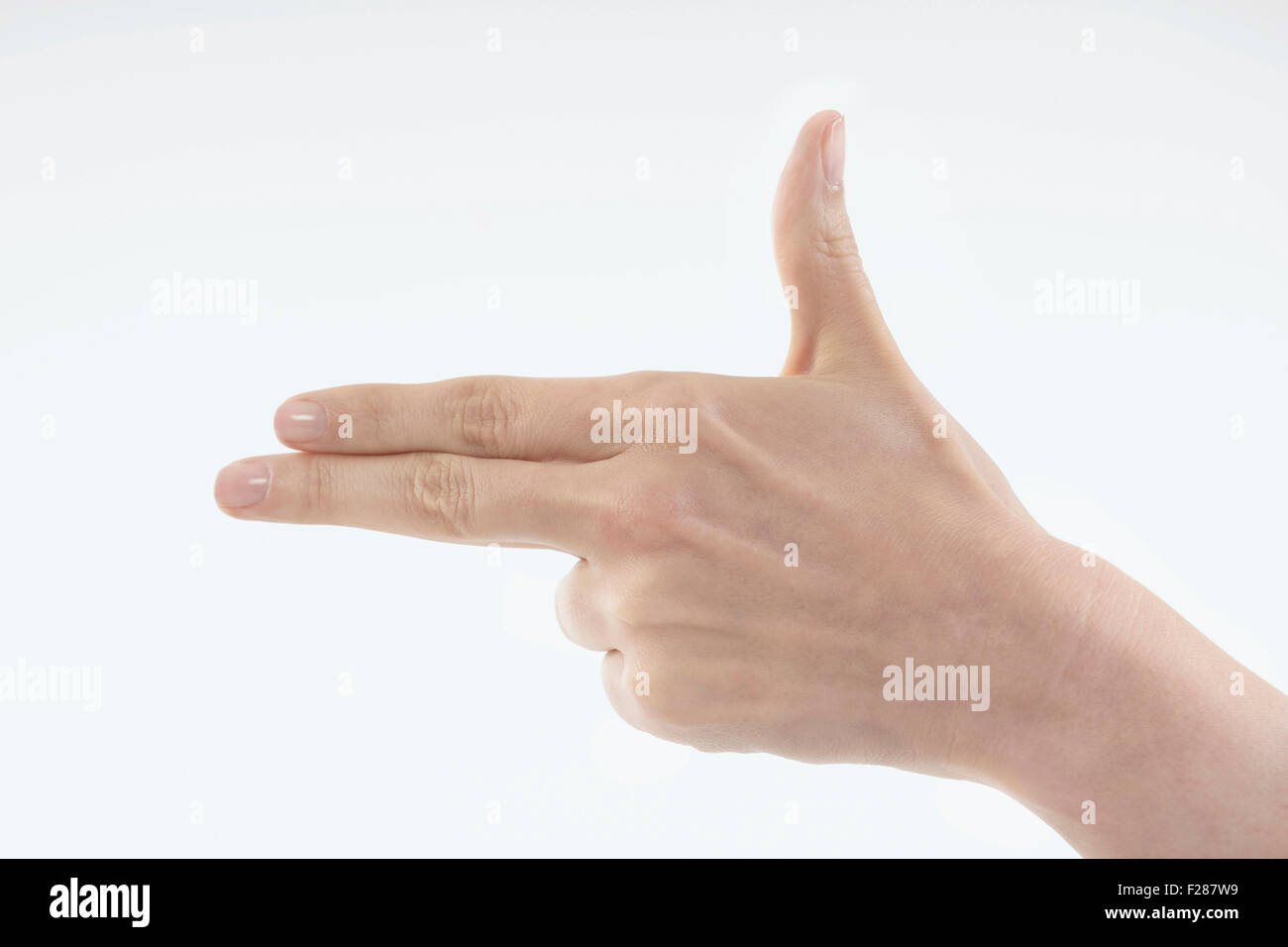 Woman pointing gun hi-res stock photography and images - Alamy
