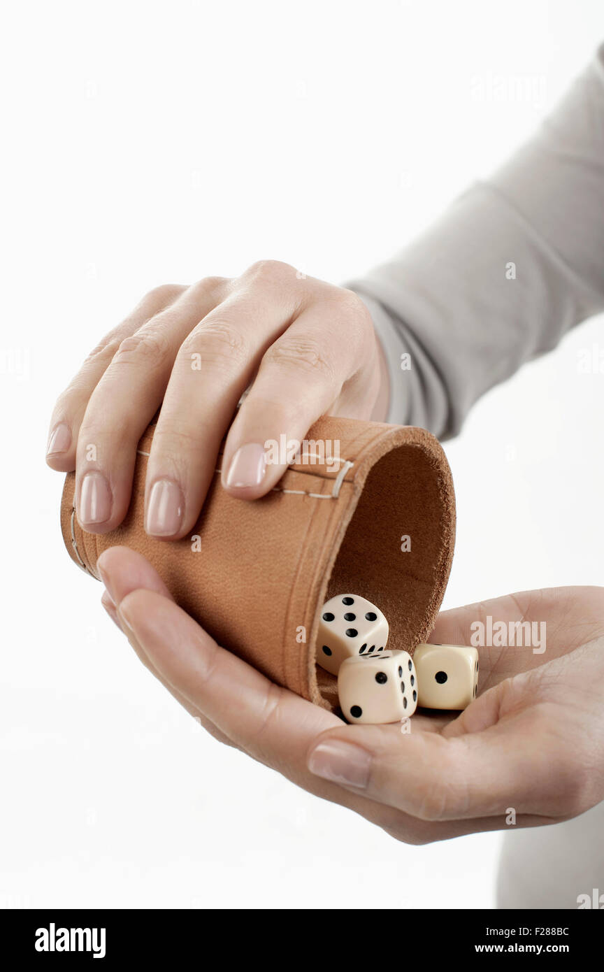 Hand with dice hi-res stock photography and images - Alamy