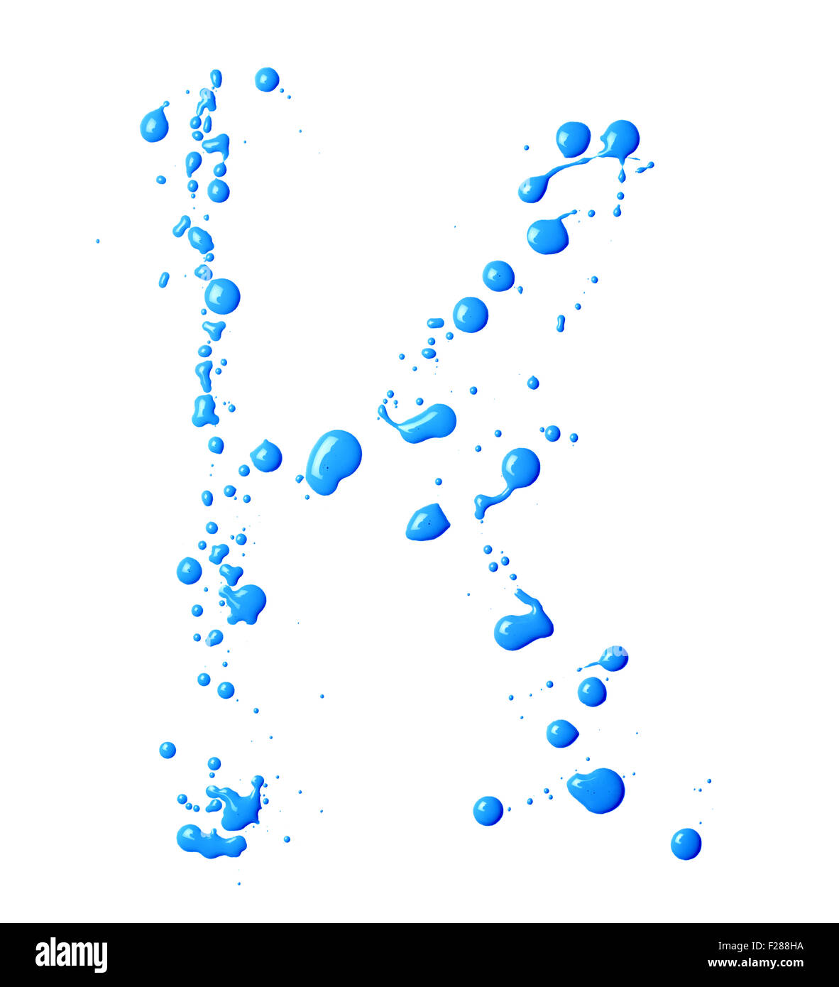 Letter K character made with the oil paint drops and spills, isolated ...
