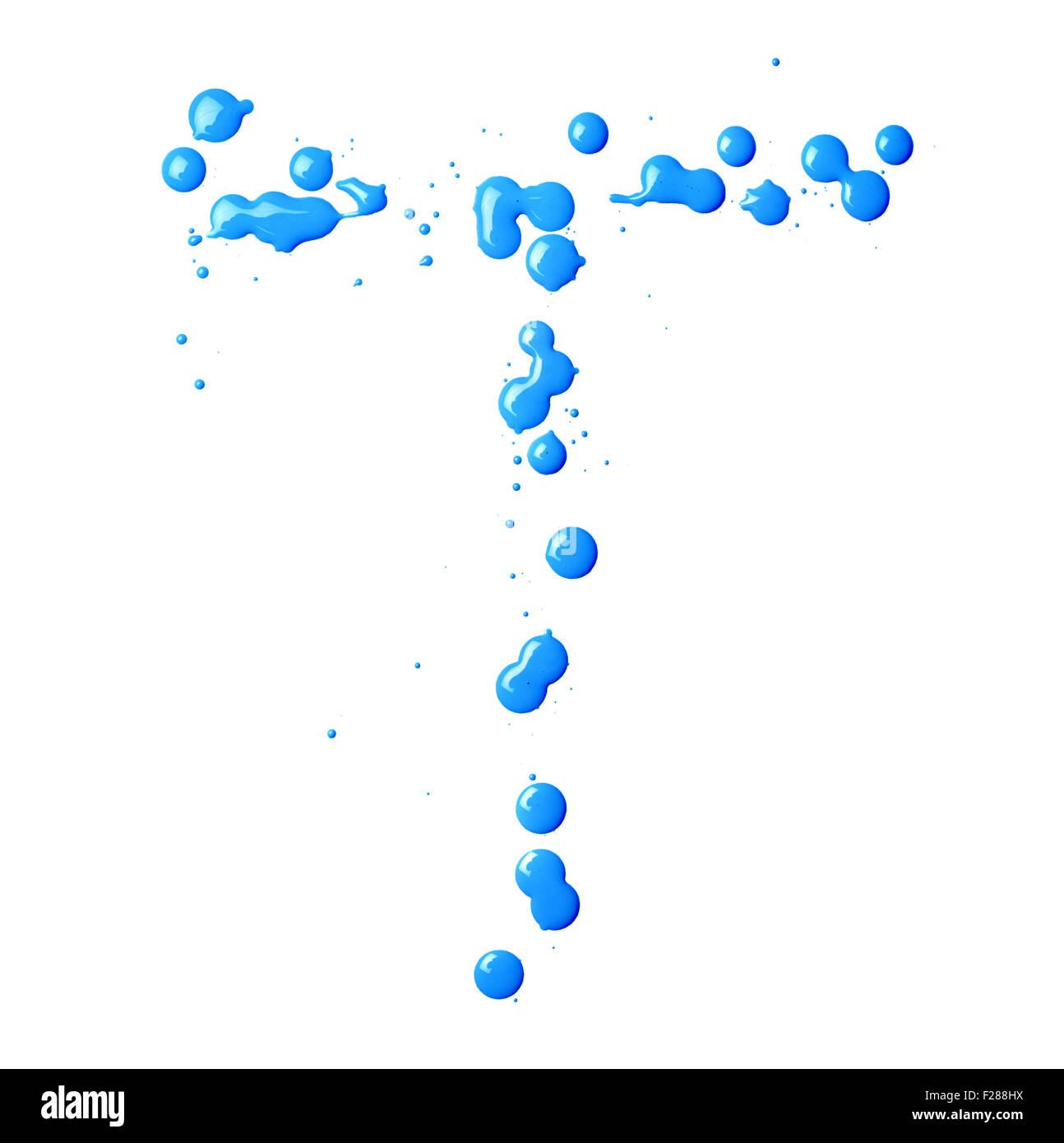 Letter T character made with the oil paint drops and spills, isolated ...