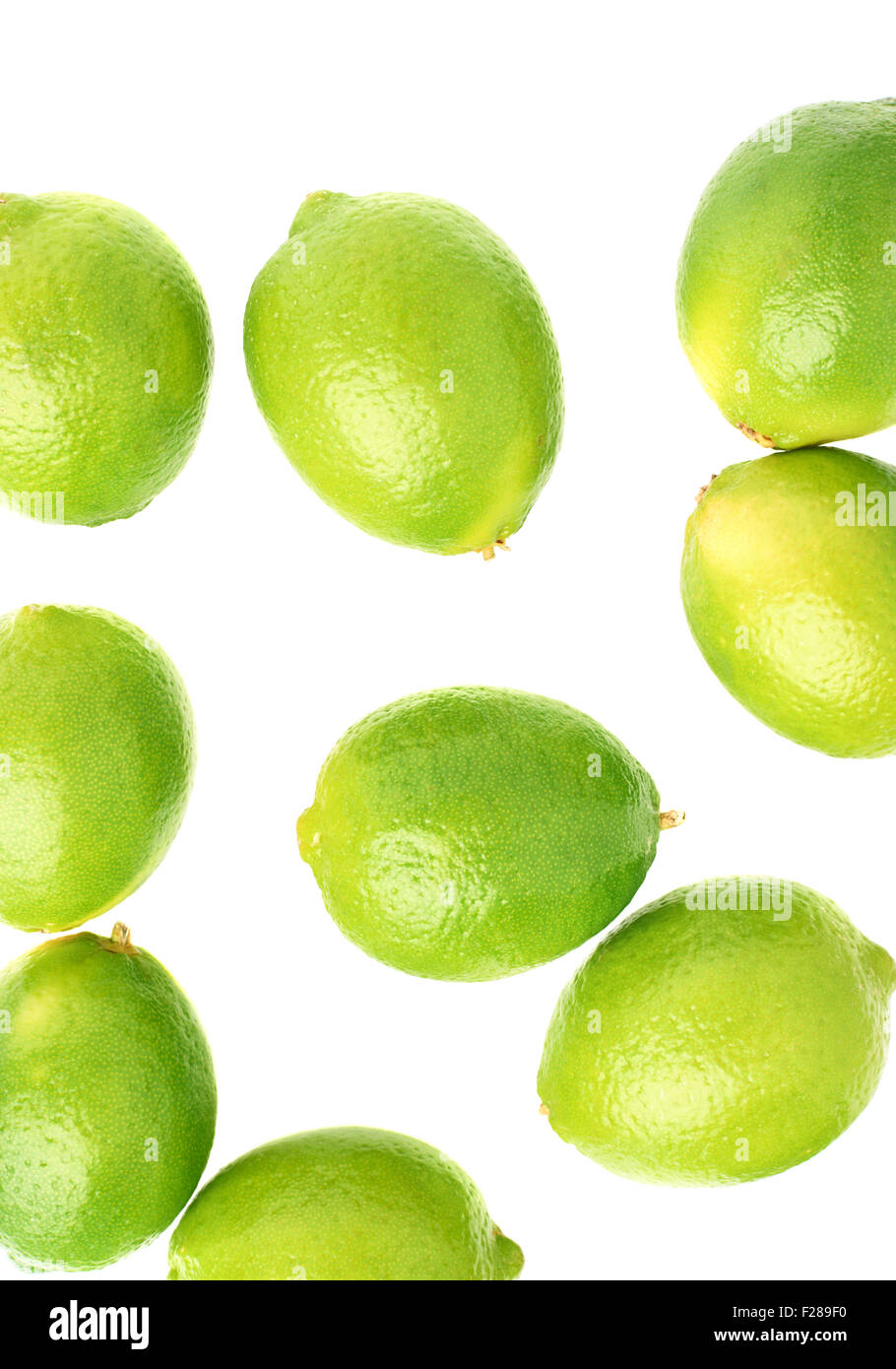 Surface covered with multiple ripe limes, composition isolated over the ...