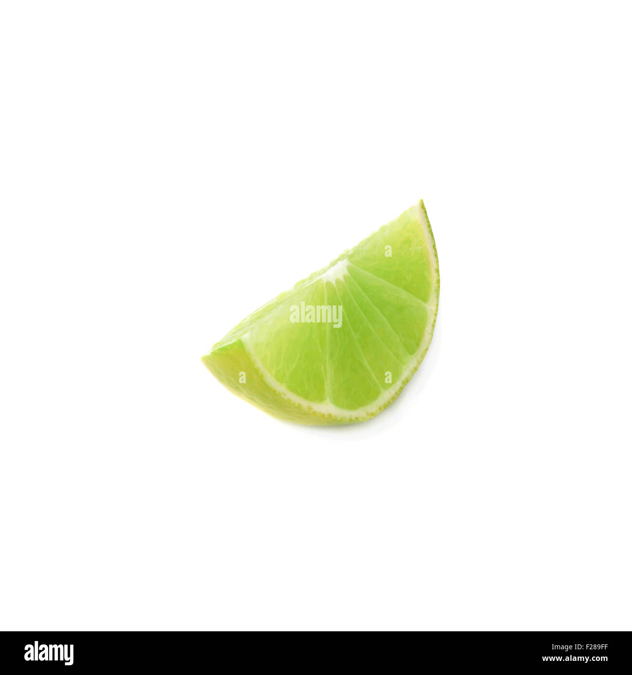 Slice section of green lime isolated over the white background Stock ...