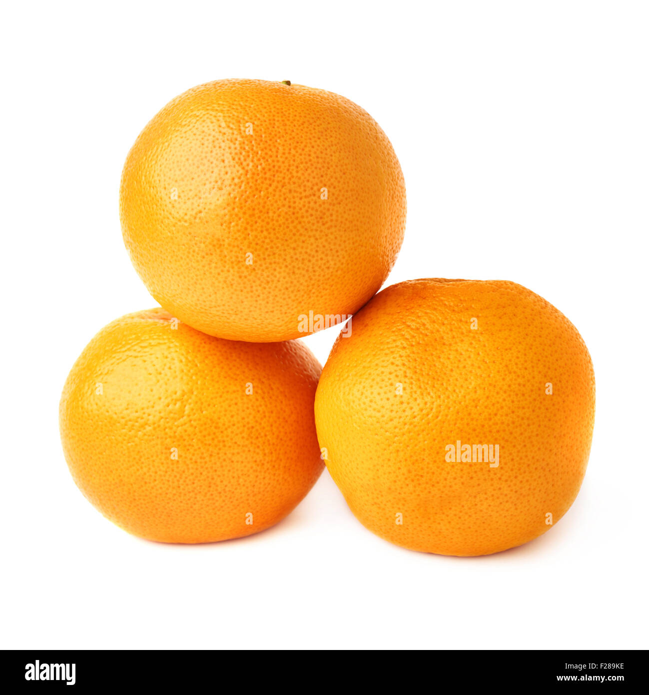 Pile of multiple ripe fresh juicy grapefruits, isolated over the white ...