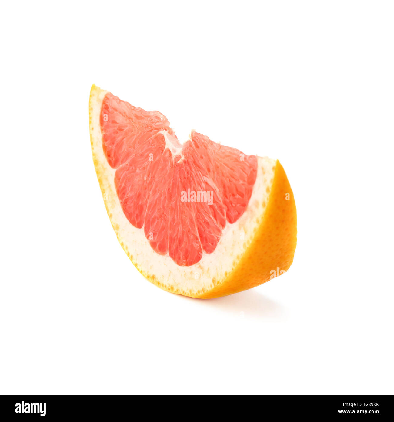 Slice section of ripe grapefruit isolated over the white background ...