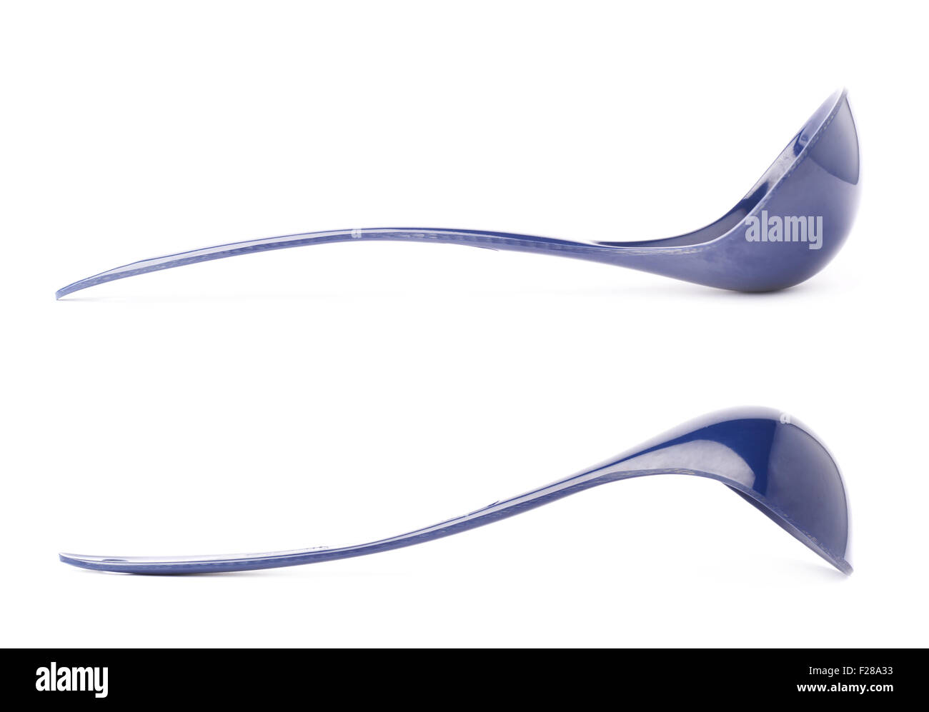 Blue glossy plasic kitchen food serving ladle spoon isolated over the ...