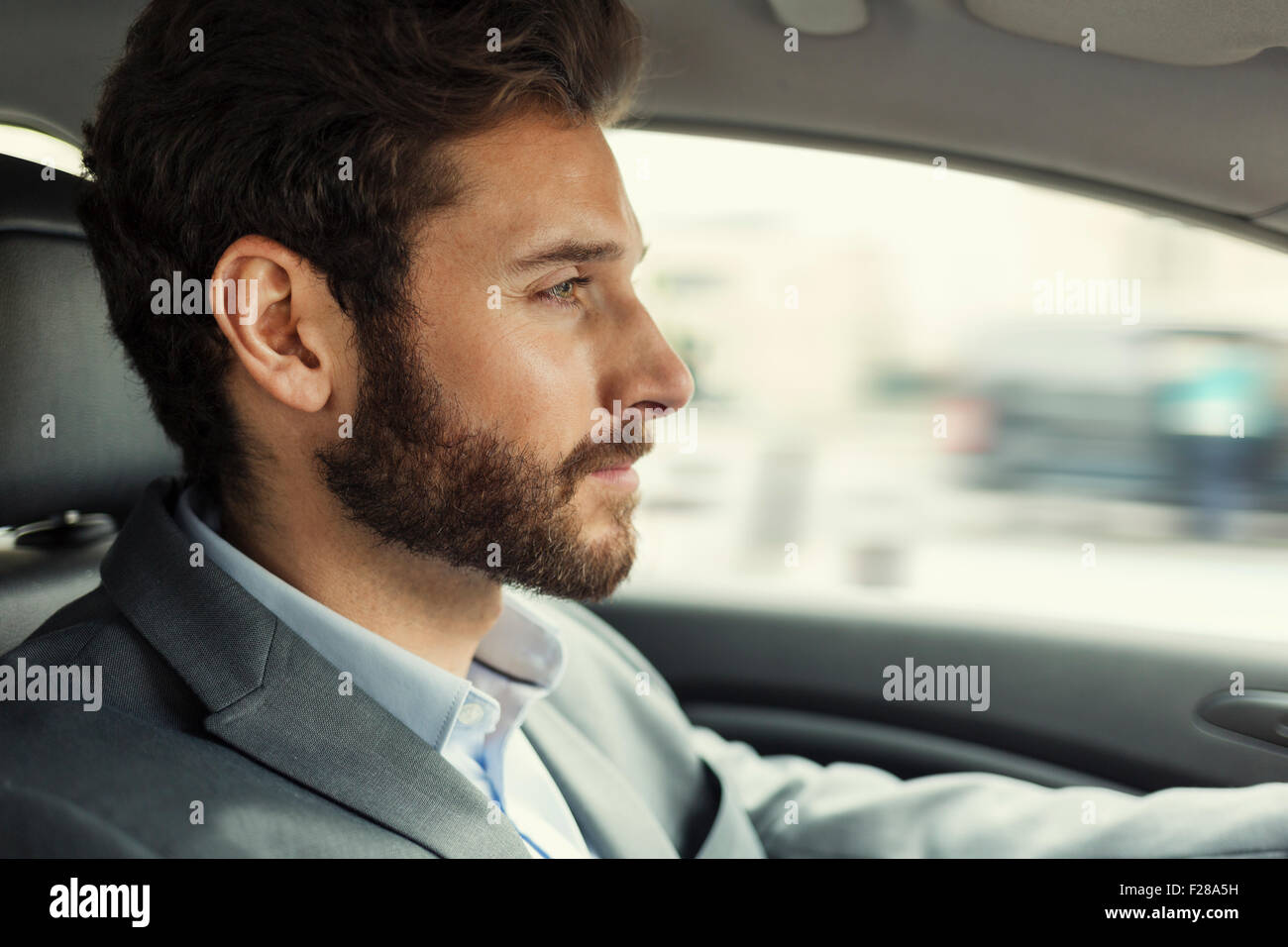 Man driving car Stock Photo - Alamy