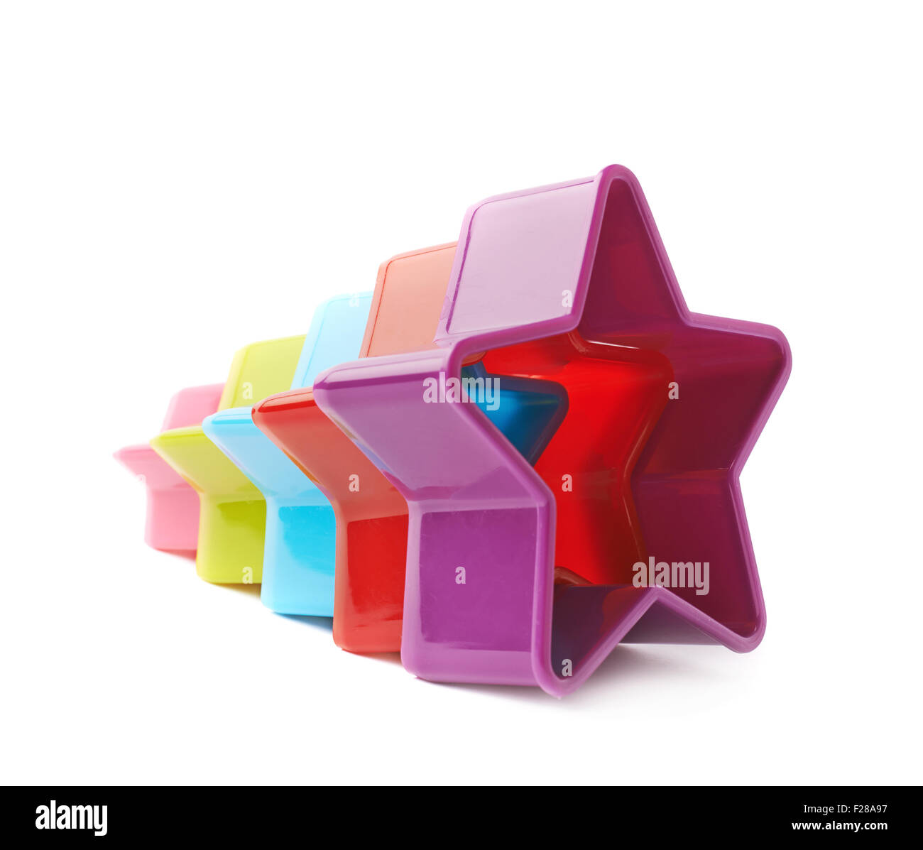 Multiple colorful star shaped set of baking molds, composition isolated ...