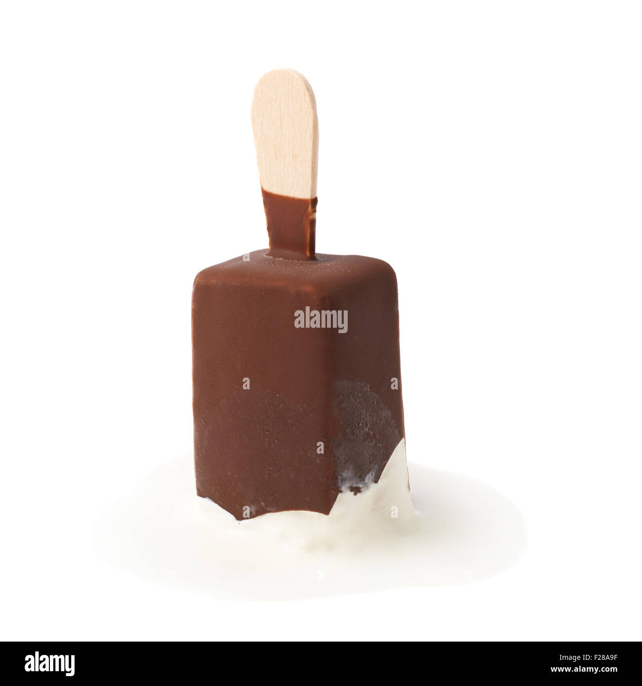 Melting chocolate covered vanilla ice cream bar on a wooden stick in a ...