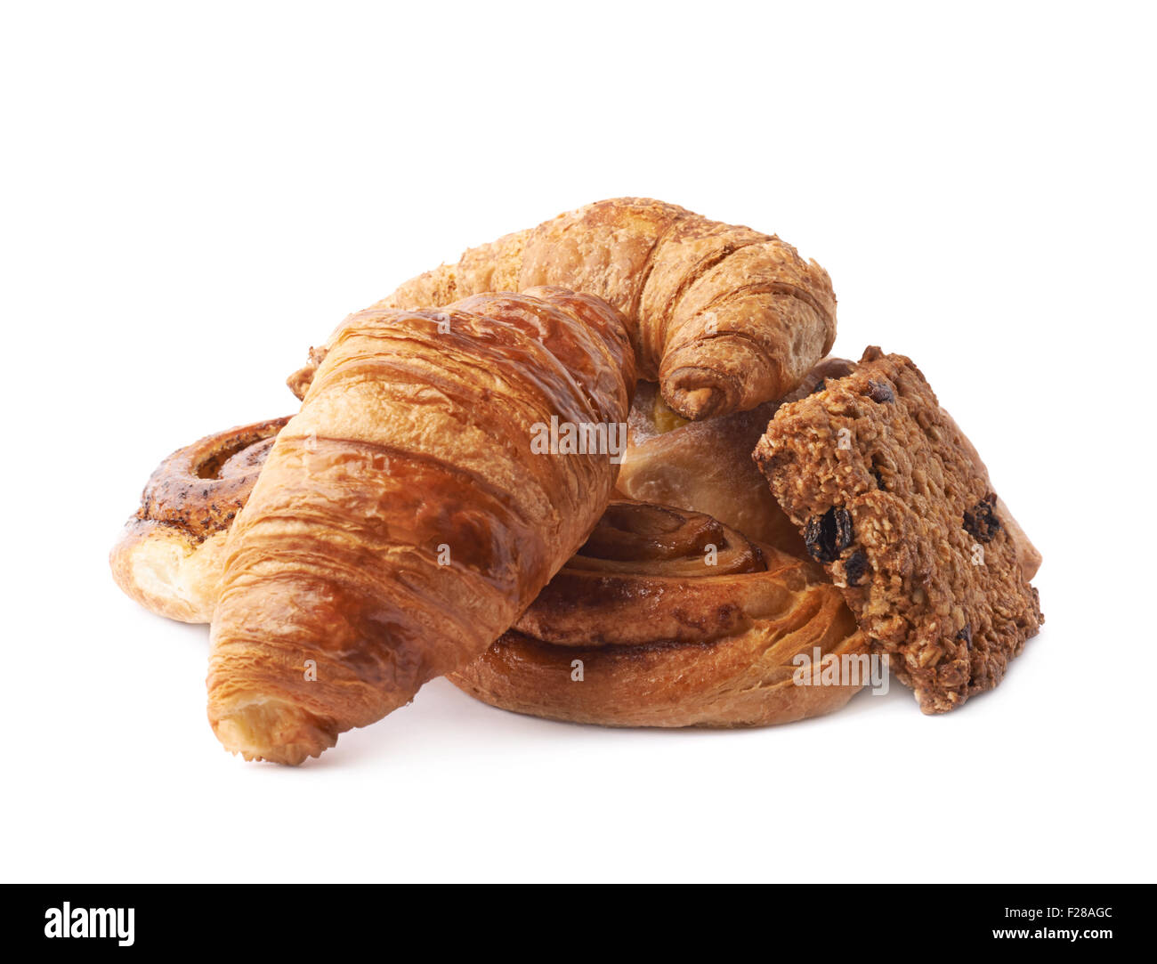 Pile of multiple different kinds of sweet bread pastry isolated over ...
