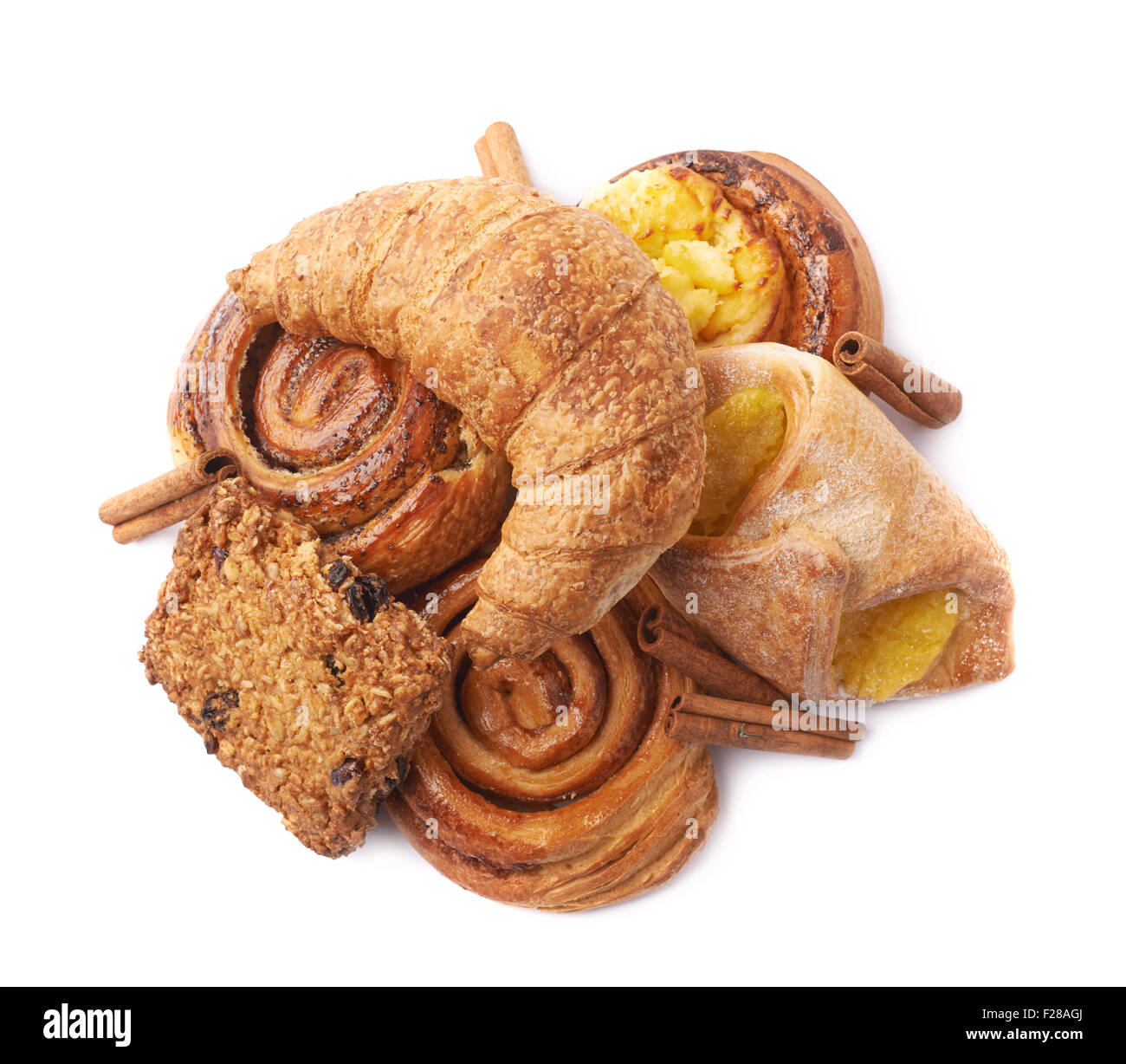 Pile of multiple different kinds of sweet bread pastry isolated over ...