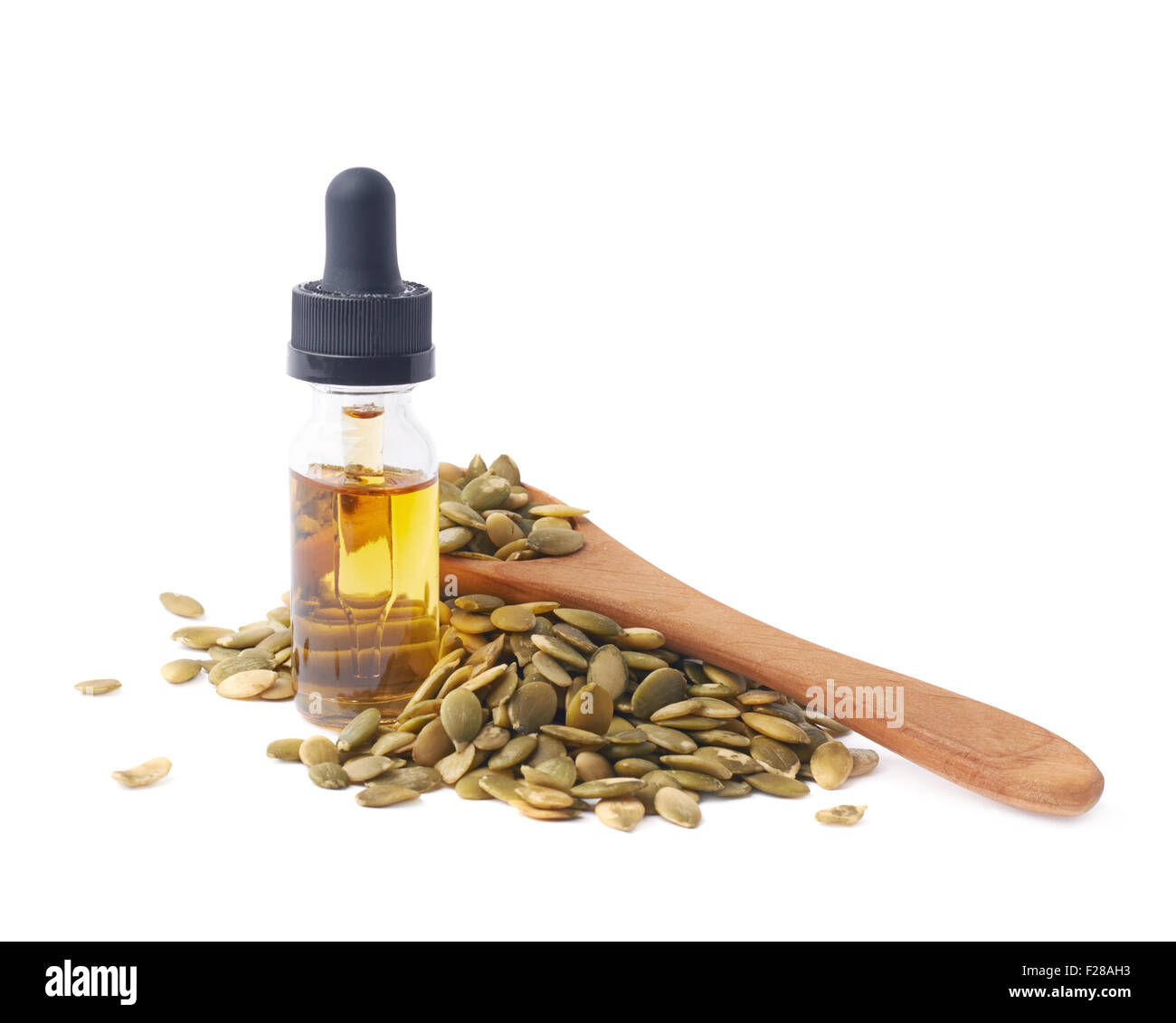 Pumpkin seed's oil composition isolated over the white background Stock ...