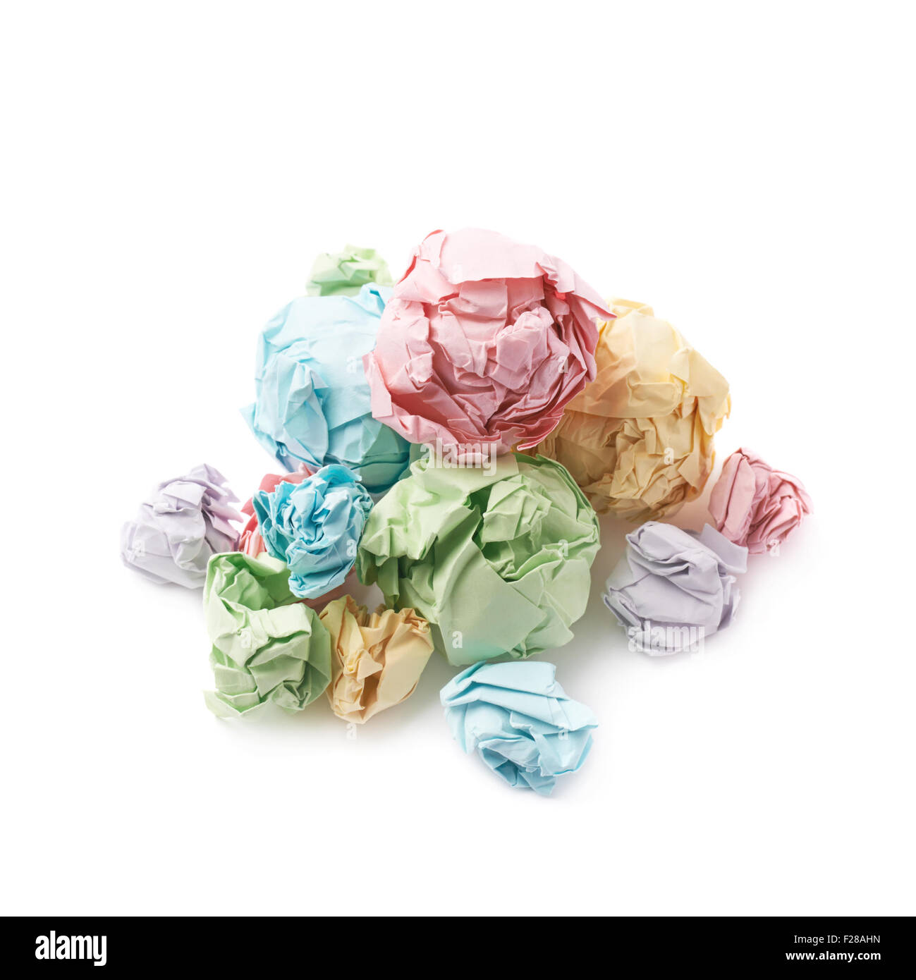 Pile of multiple colorful crumpled paper balls isolated over the white ...