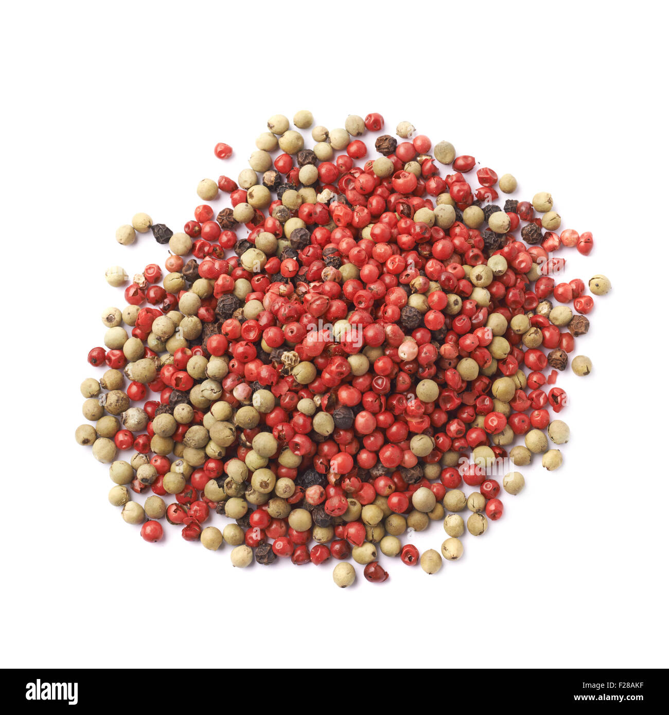 Pile of multiple red, white and black pepper seeds mix isolated over ...