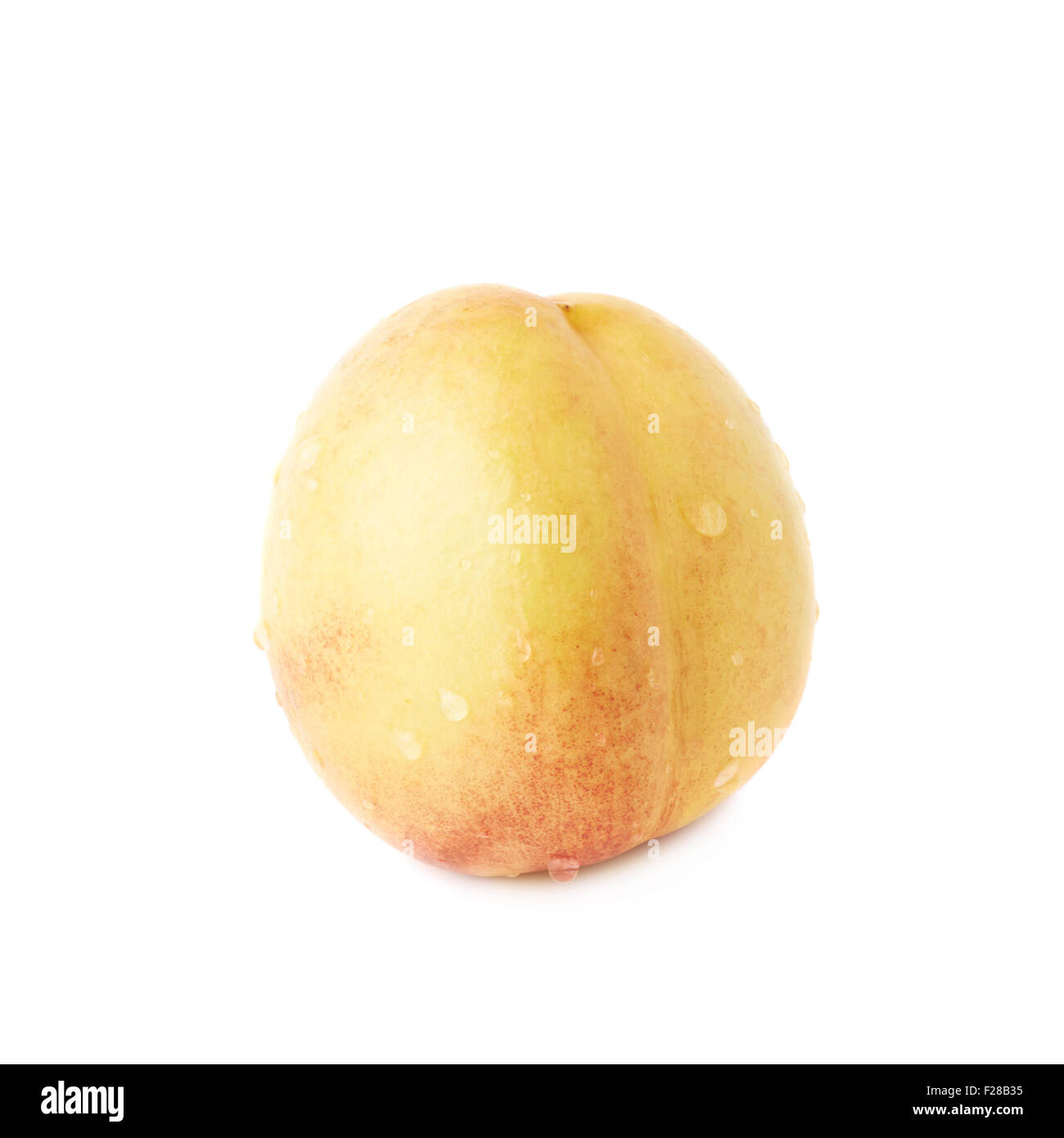 Single ripe nectarine covered with water drops, isolated over the white ...