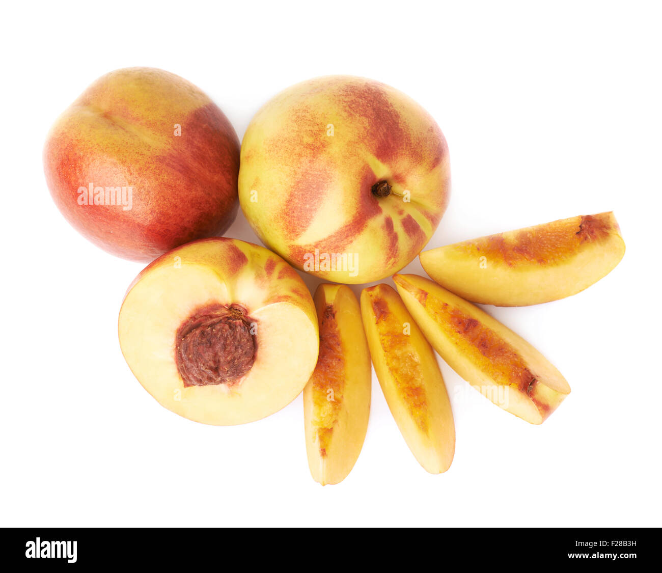 Ripe nectarine fruit composition, isolated over the white background ...