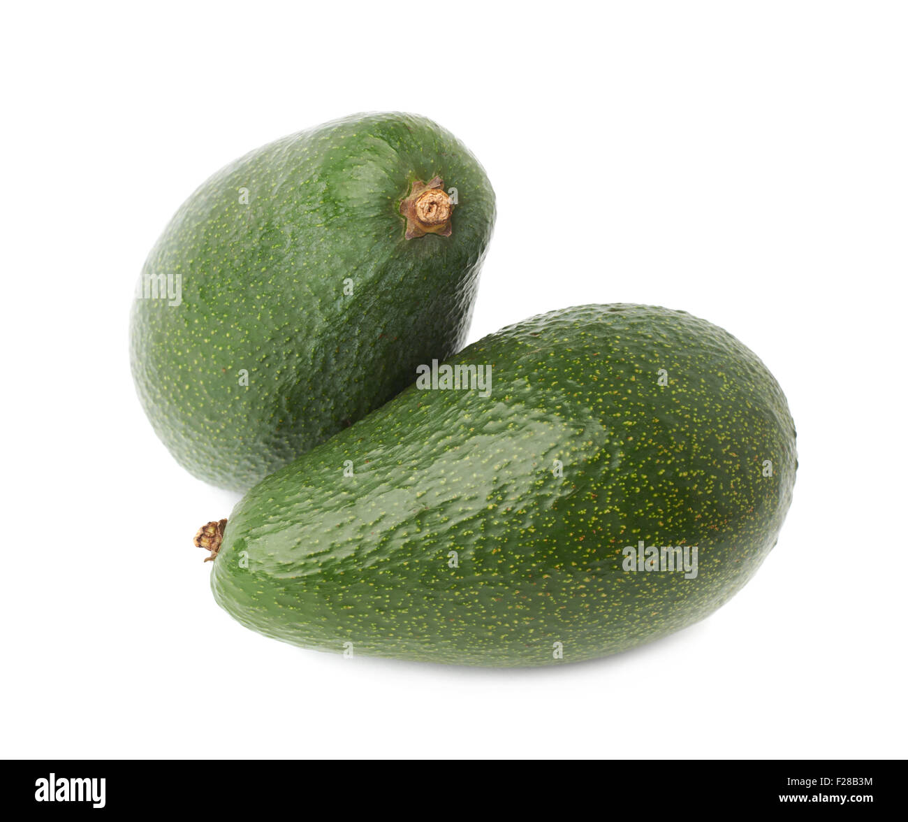 Green ripe avocado fruits composition isolated over the white ...