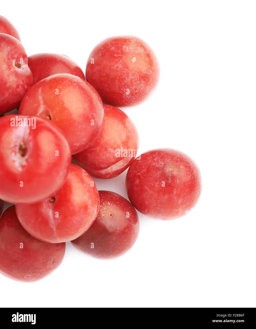 Pile of multiple red victoria plums isolated over the white background ...