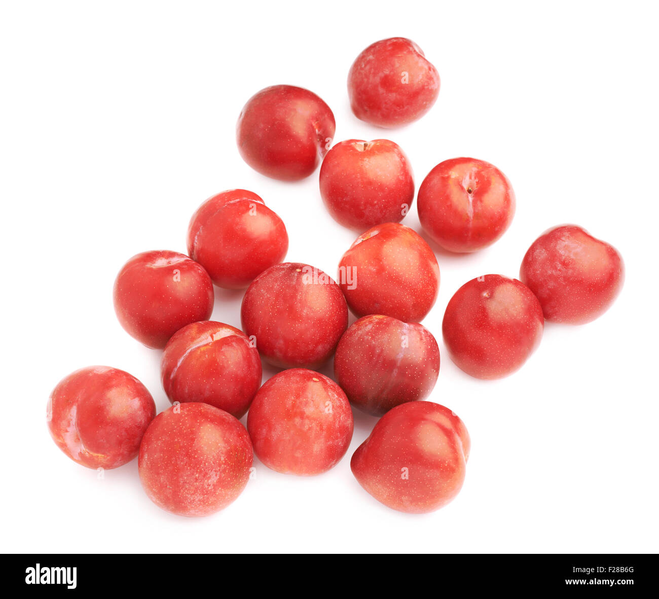 Pile of multiple red victoria plums isolated over the white background ...