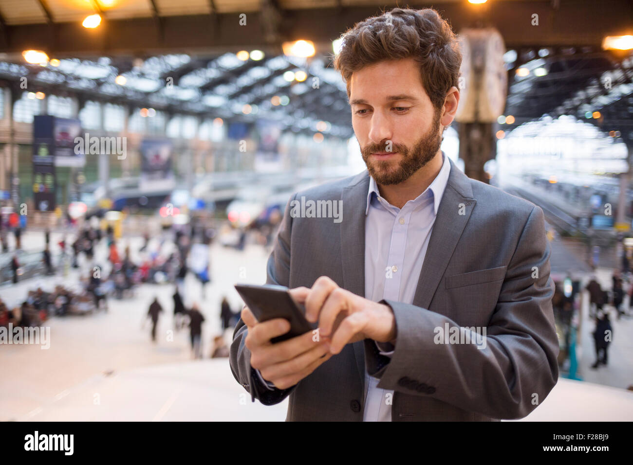 Male texting station hi-res stock photography and images - Alamy