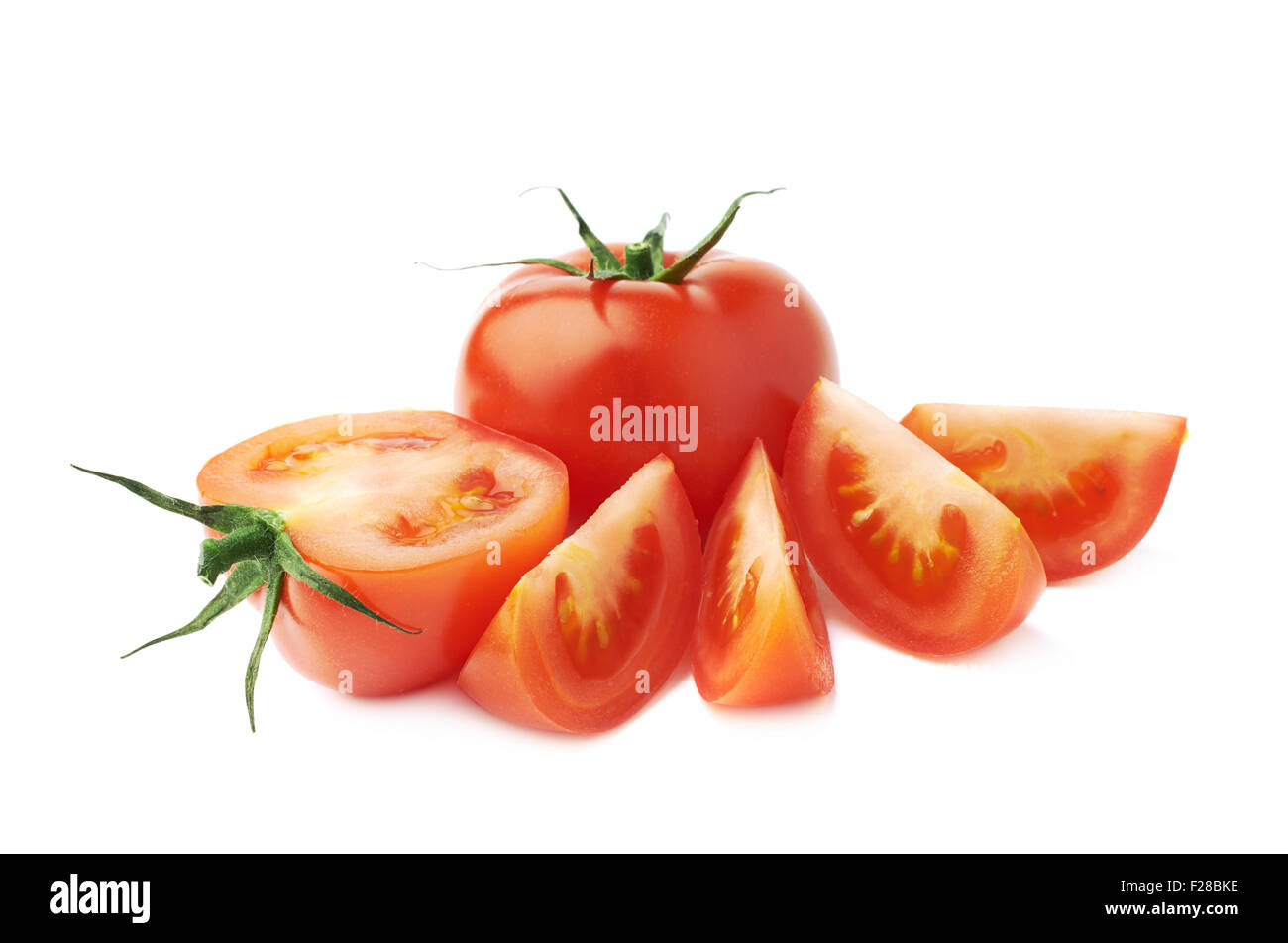 Sliced and cut tomato composition isolated Stock Photo - Alamy