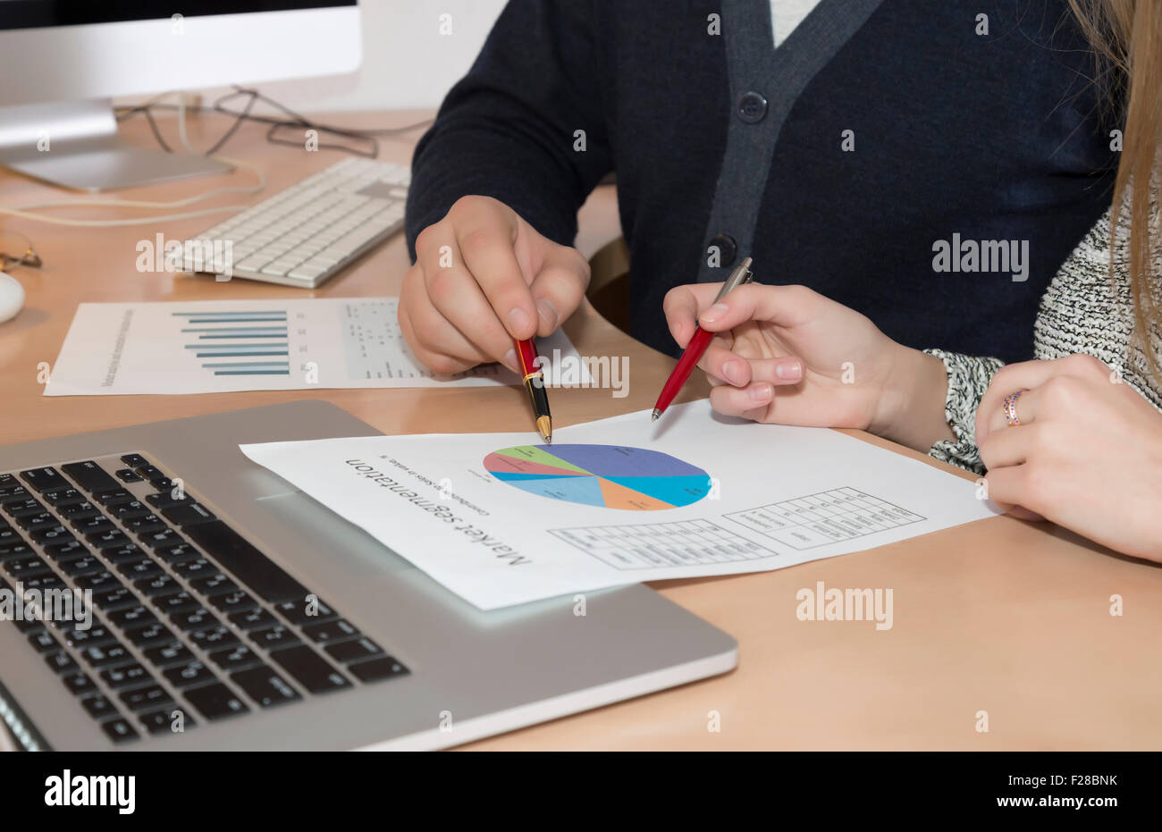 Hands of people working on presentation Stock Photo - Alamy
