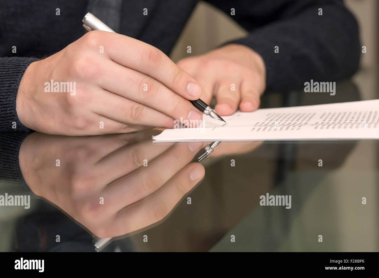 Man signing notary document signature hi-res stock photography and ...