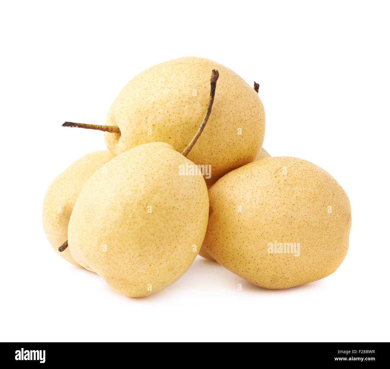Pile of multiple yellow pears isolated Stock Photo - Alamy