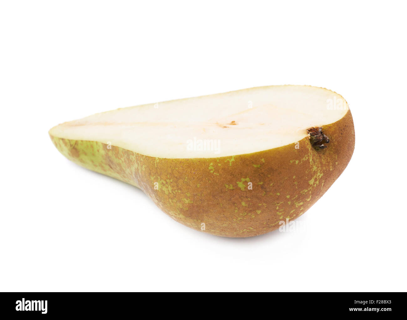 Green pear cut in half isolated Stock Photo - Alamy